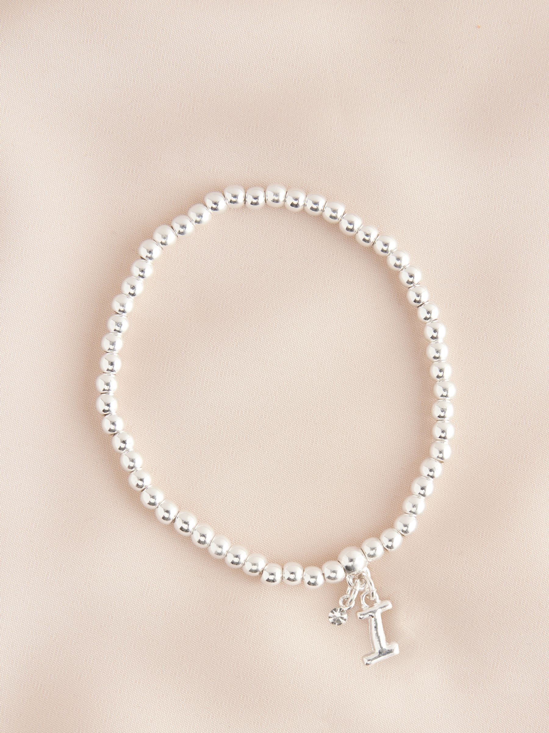 Buy Silver Tone Initial Stretch Bracelet from the Next UK online shop