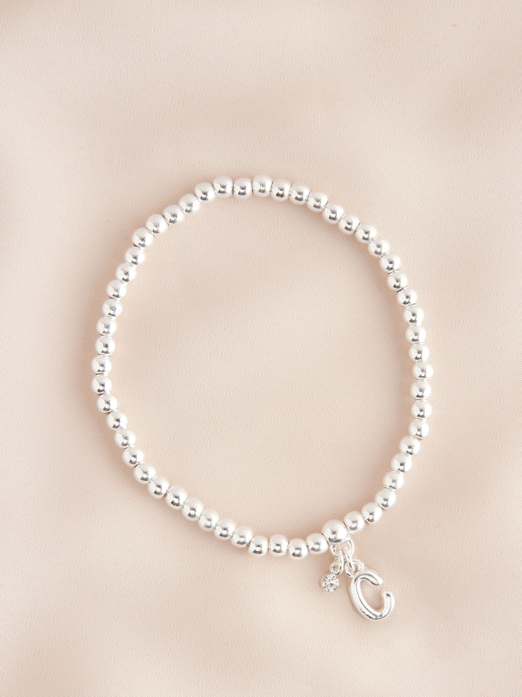 Buy Silver Tone Initial Stretch Bracelet from the Next UK online shop