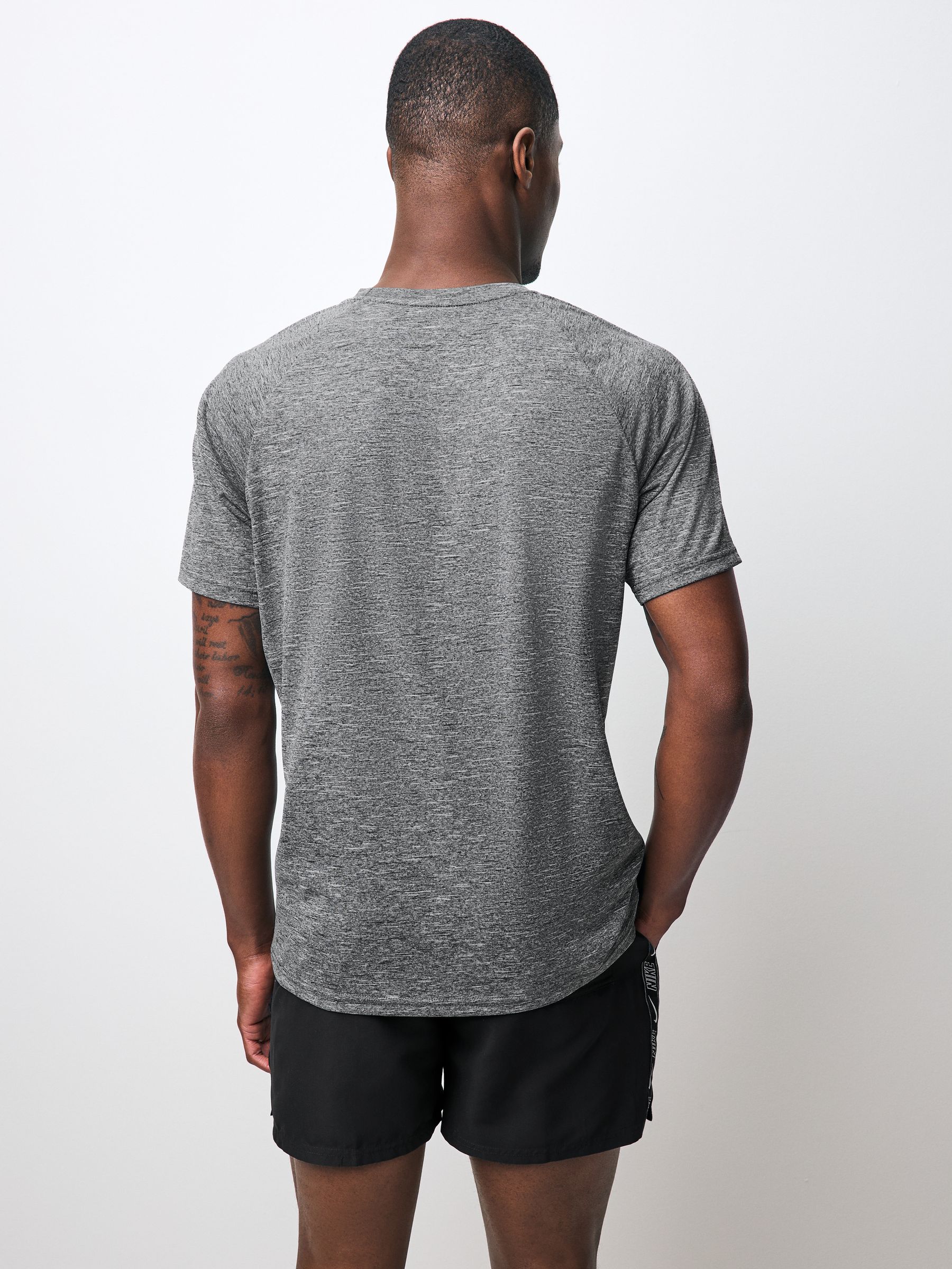 Buy Nike Black Short Sleeve Hydroguard Rash T-Shirt from the Next UK ...