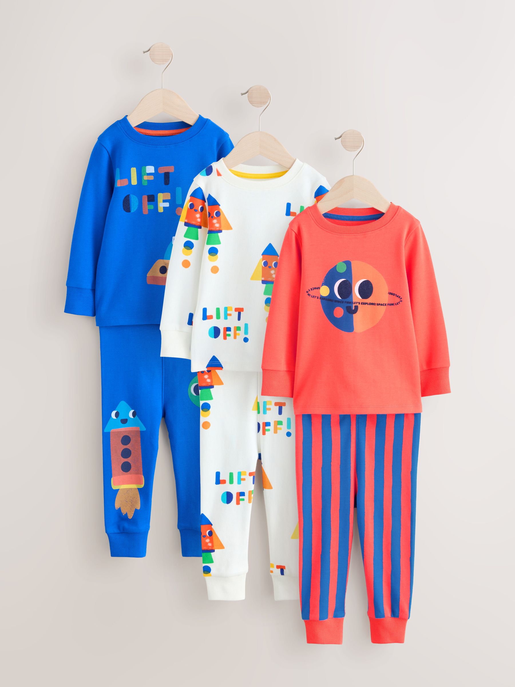 Buy Orange/Navy Space 3 Pack Snuggle Pyjamas (9mths-8yrs) from the Next ...
