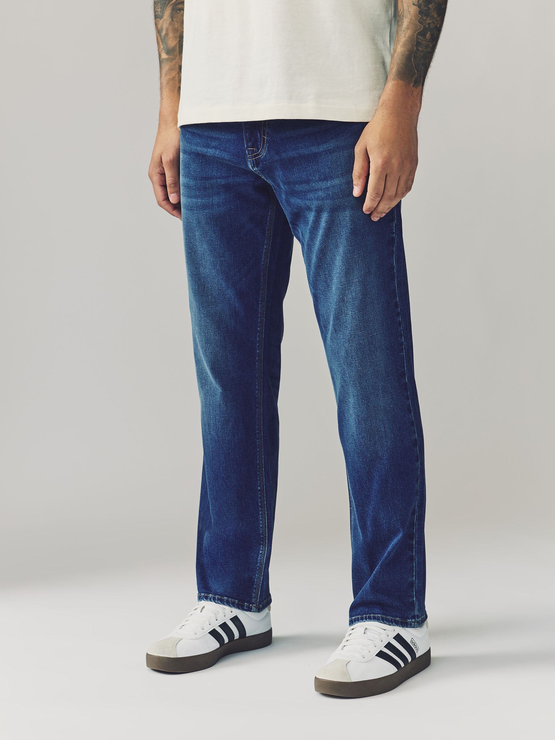 Buy Blue Straight Fit Lightweight Motion Flex Denim Jeans from the Next ...