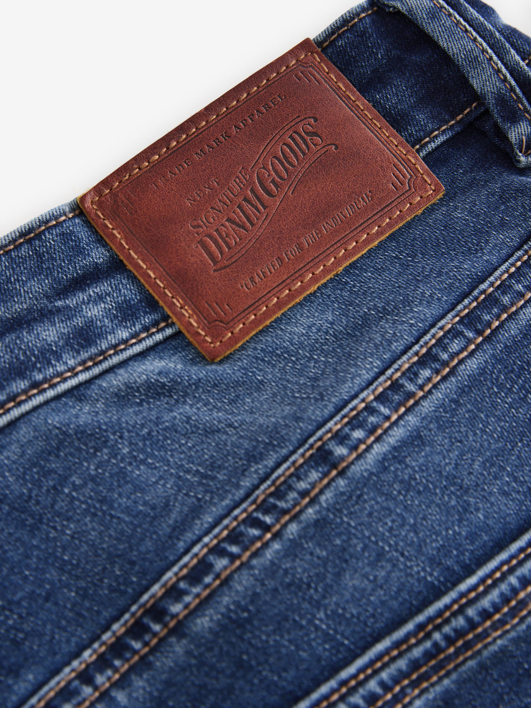 Buy Blue Straight Fit Lightweight Motion Flex Denim Jeans from the Next ...