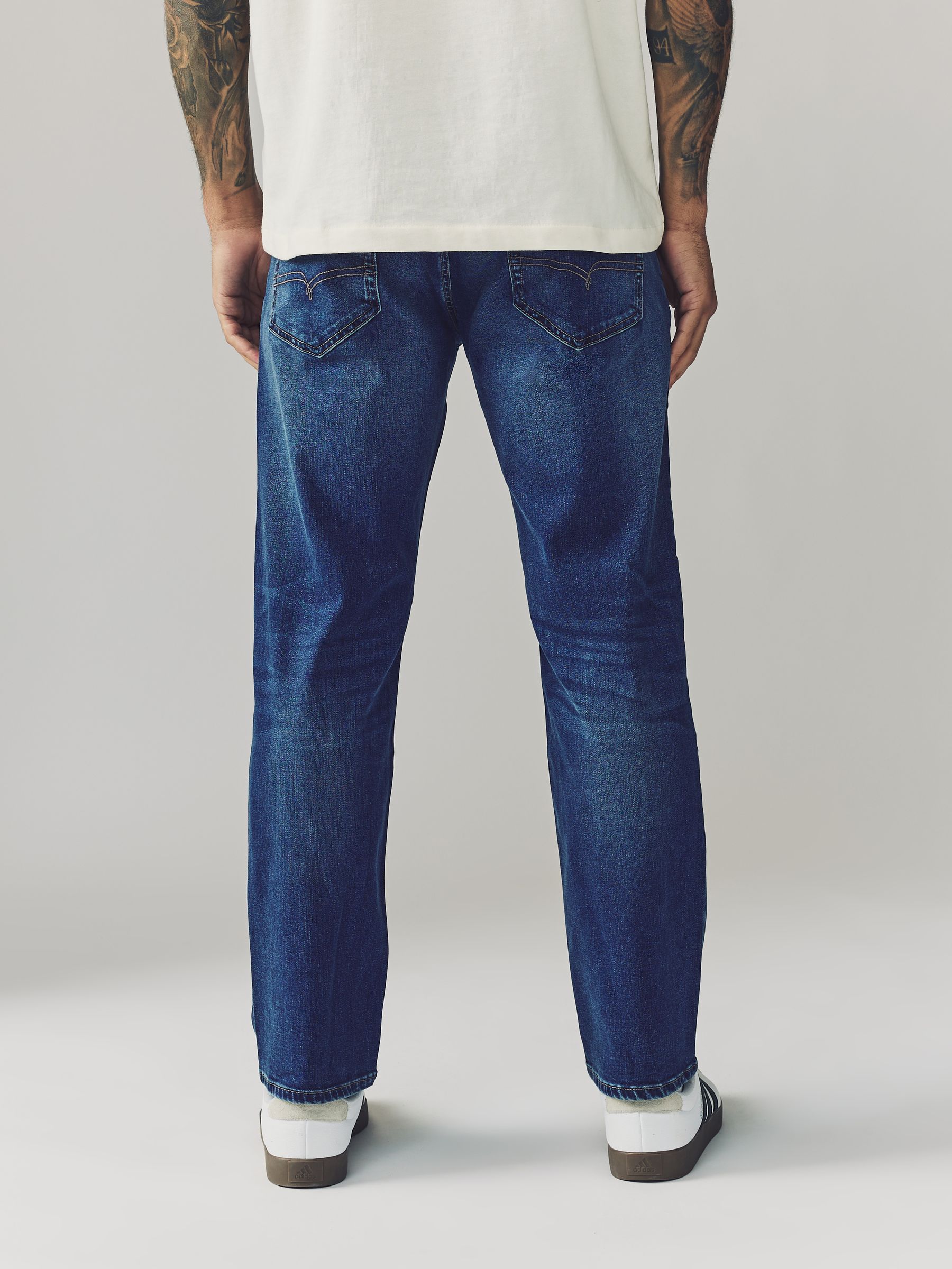 Buy Blue Straight Fit Lightweight Motion Flex Denim Jeans from the Next ...