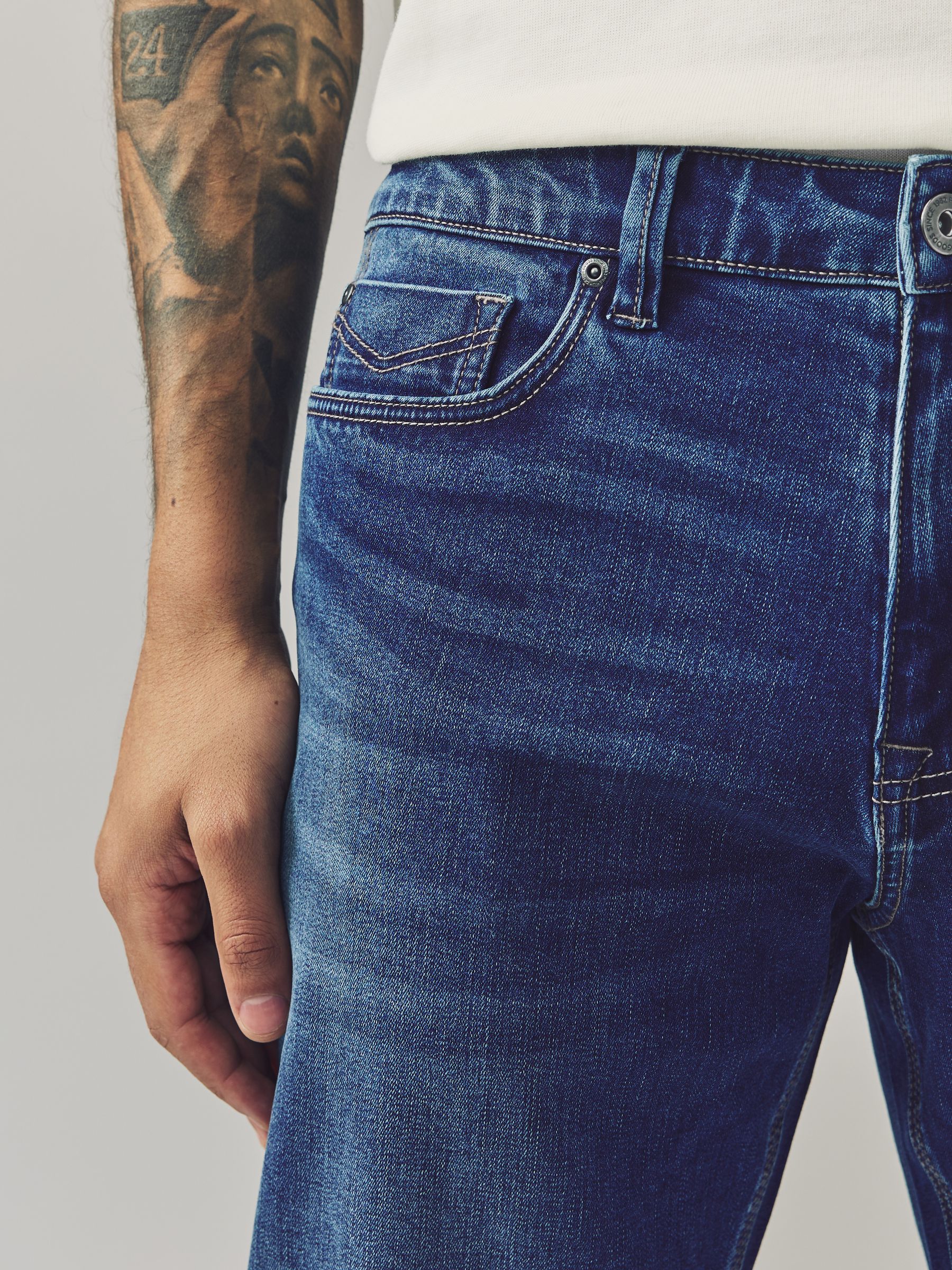 Buy Blue Straight Fit Lightweight Motion Flex Denim Jeans from the Next ...