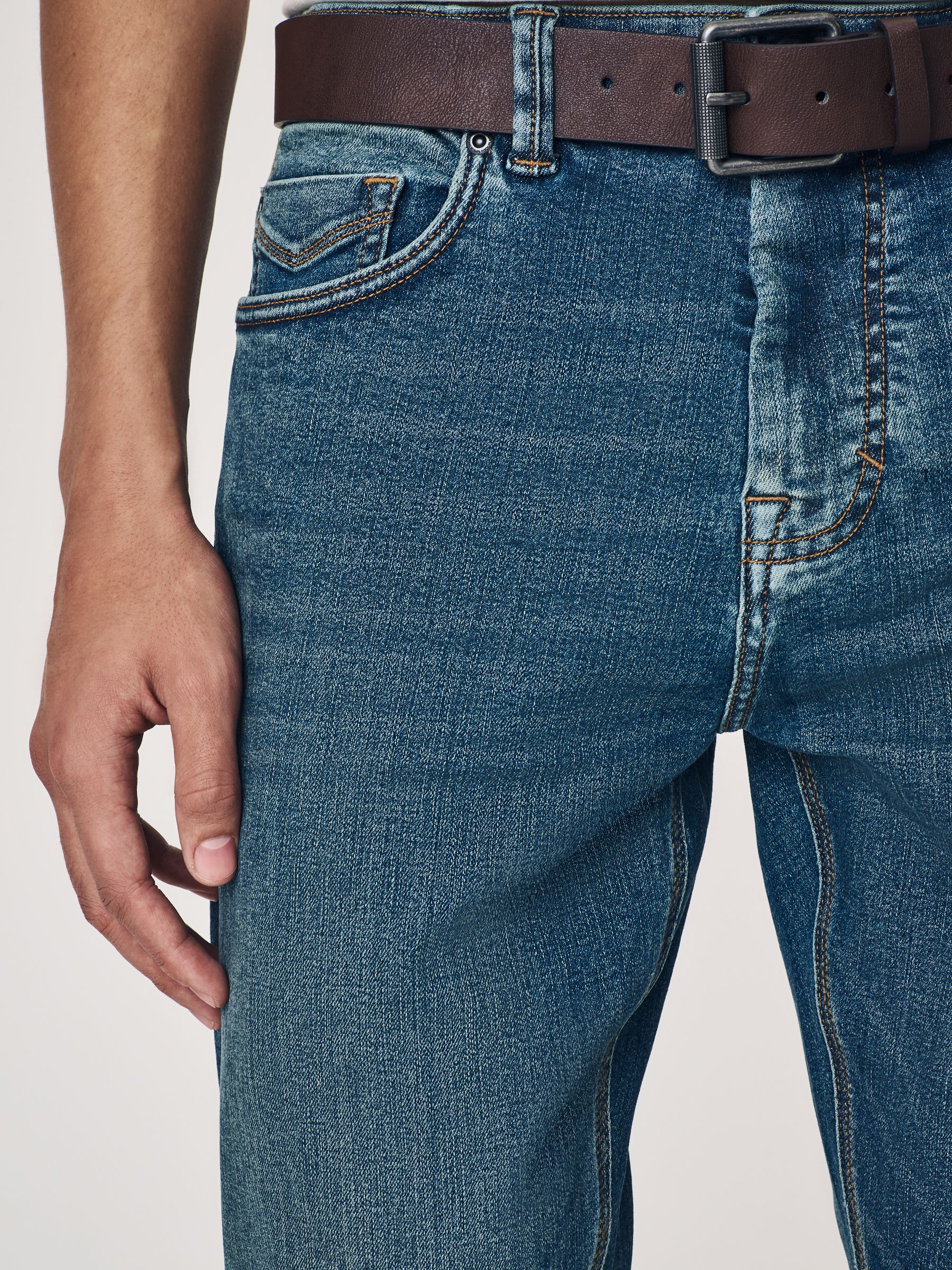 Buy Blue Mid Vintage Slim Fit Belted Motionflex Jeans from Next Saudi ...