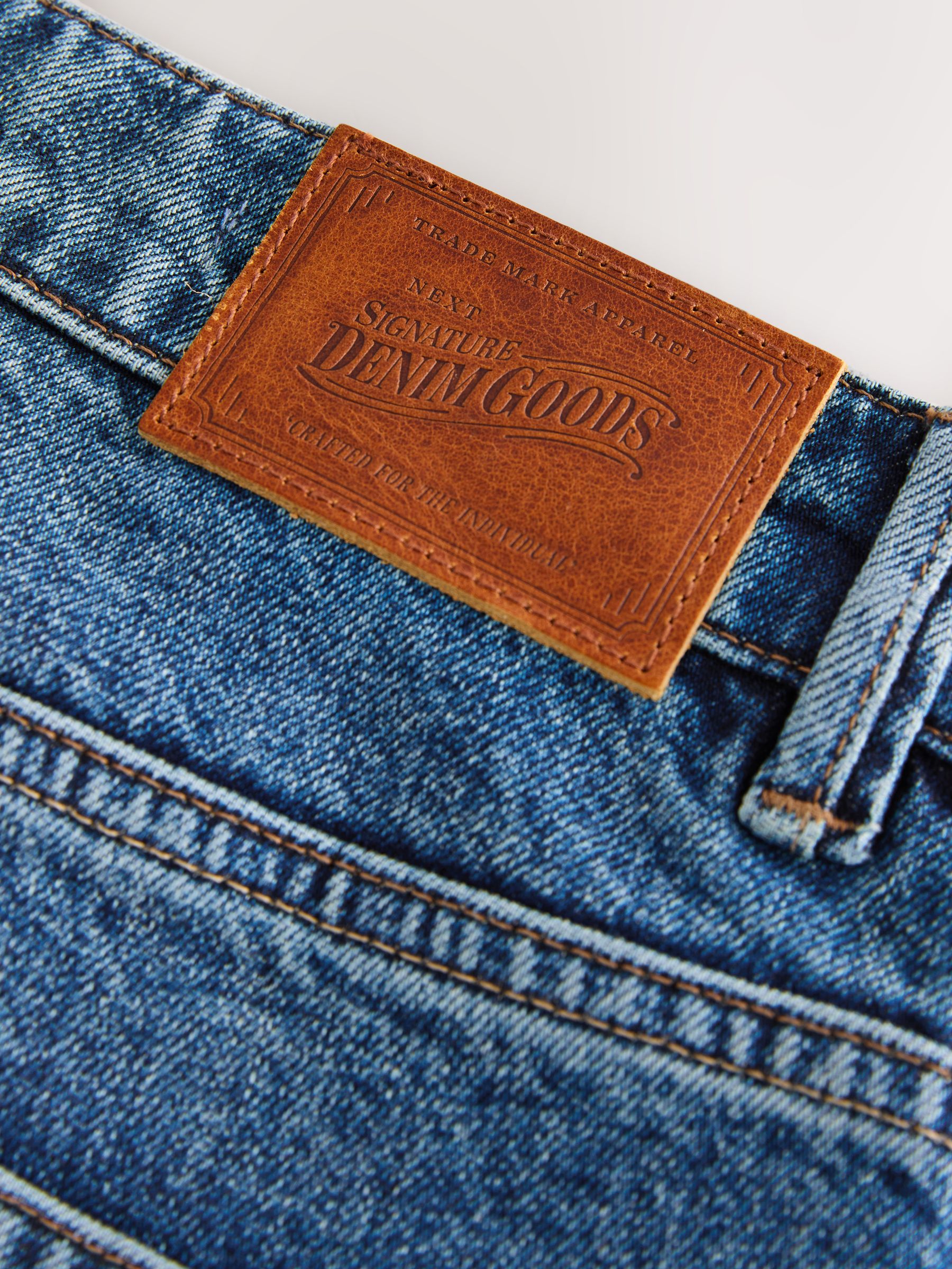 Buy Mid Blue Straight Fit Signature Soft Touch Denim Jeans from the ...