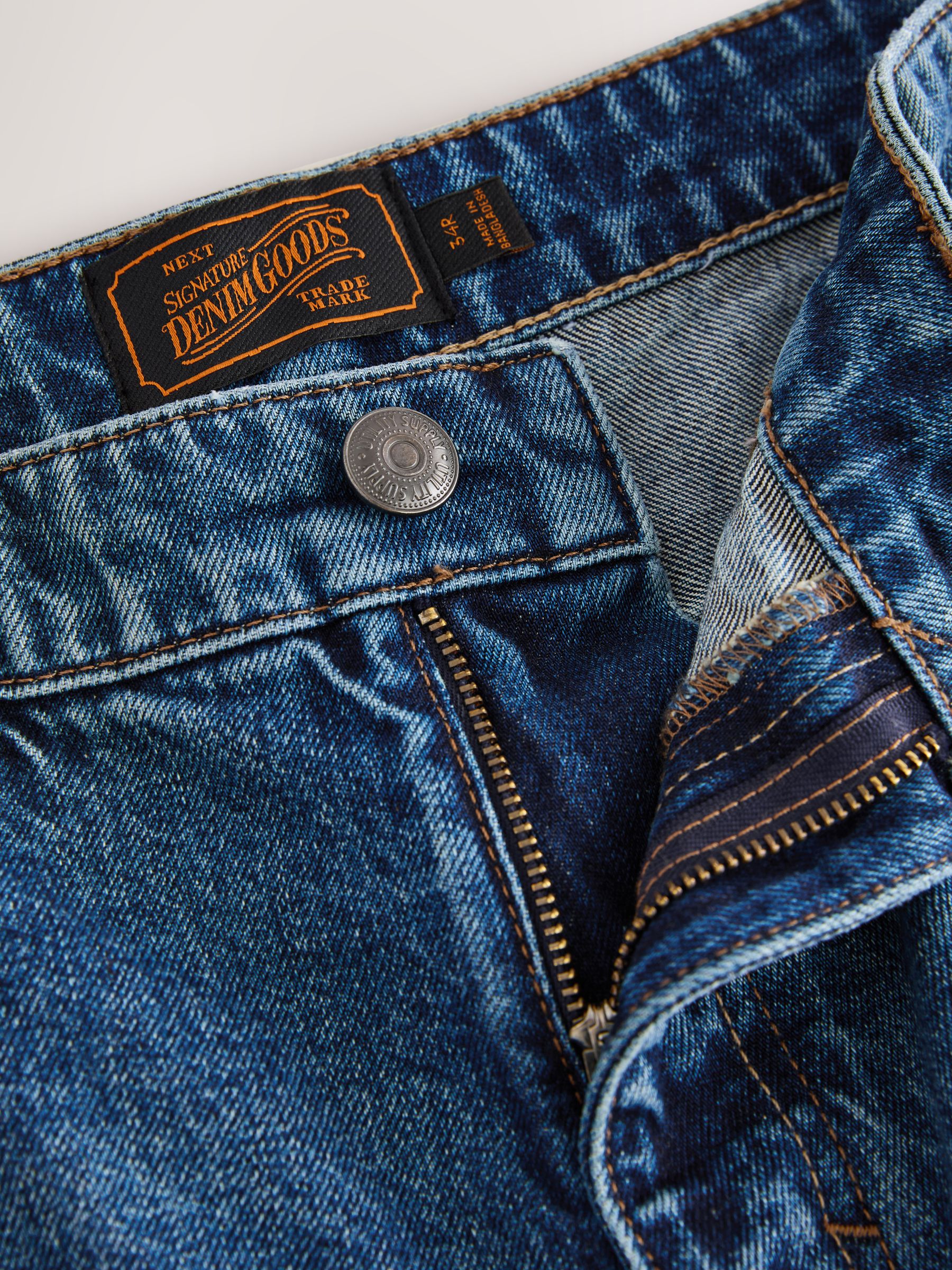 Buy Mid Blue Straight Fit Signature Soft Touch Denim Jeans from the ...