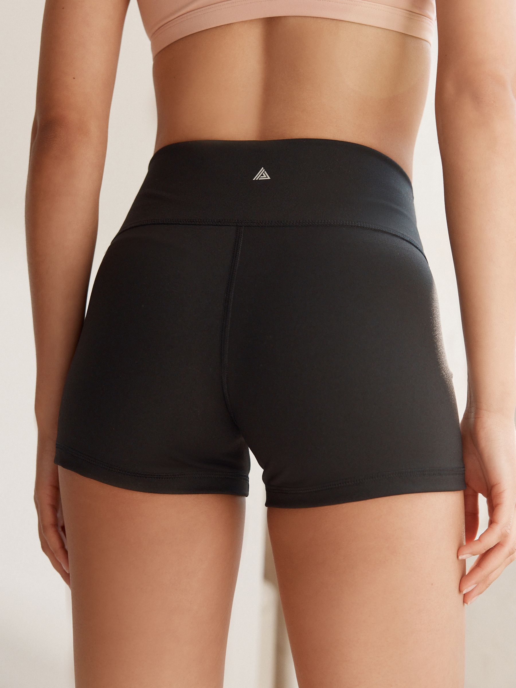 Buy Black Booty Sports Dry Tech Tummy Control Shorts from the Next UK ...