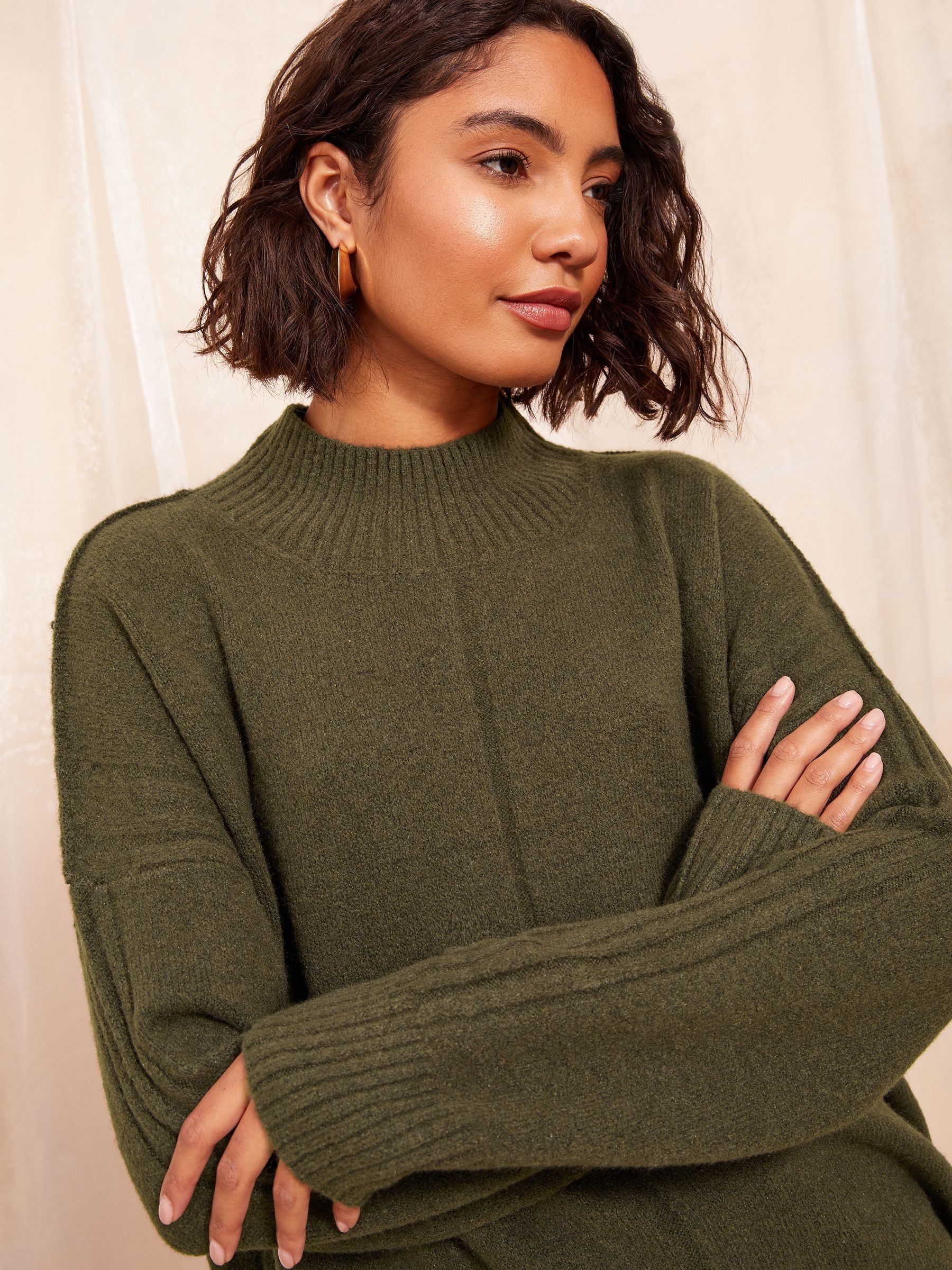 Buy Friends Like These Green High Neck Curved Hem Jumper from the Next ...