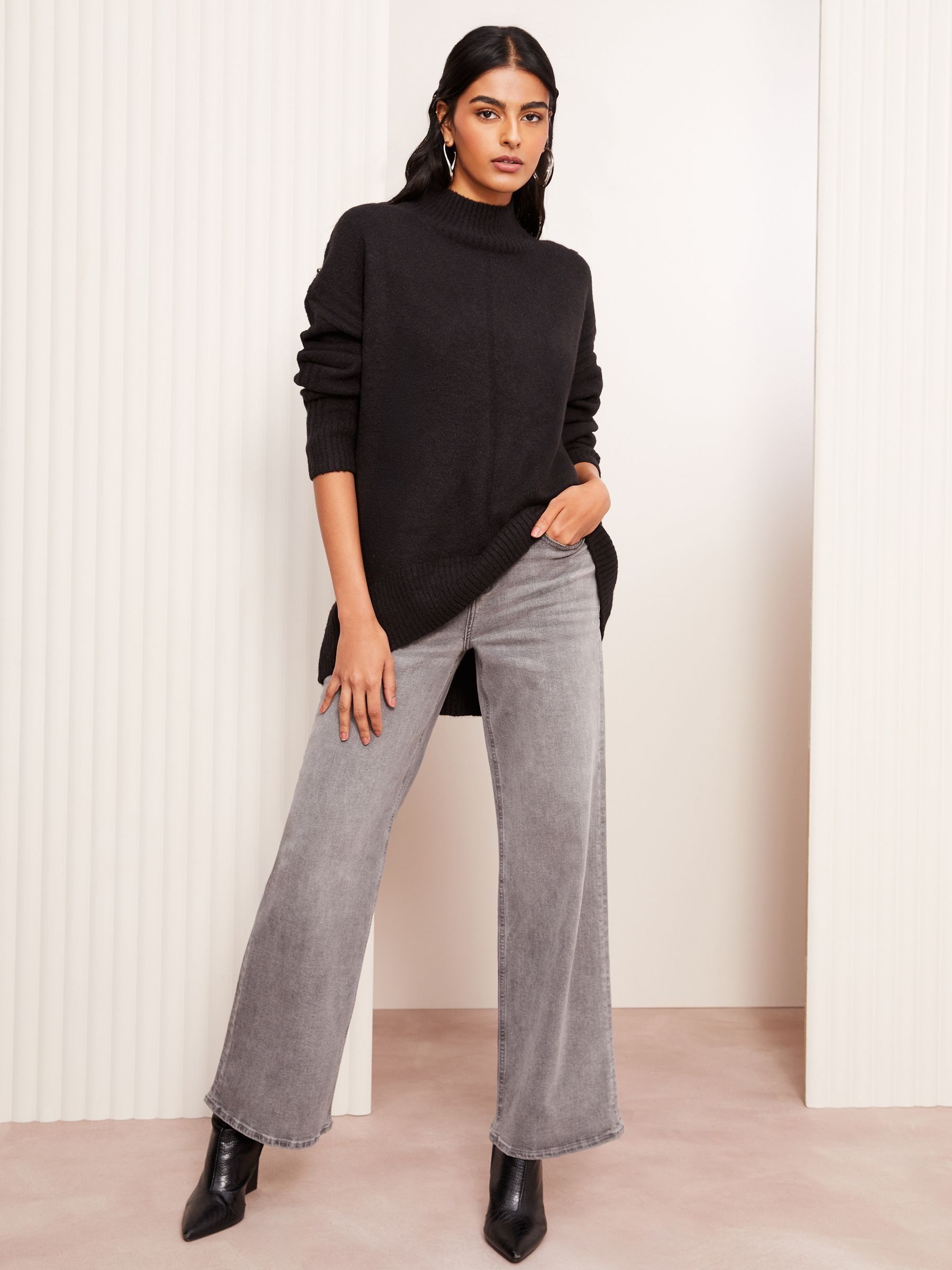 Buy Friends Like These Black High Neck Curved Hem Jumper from the Next ...