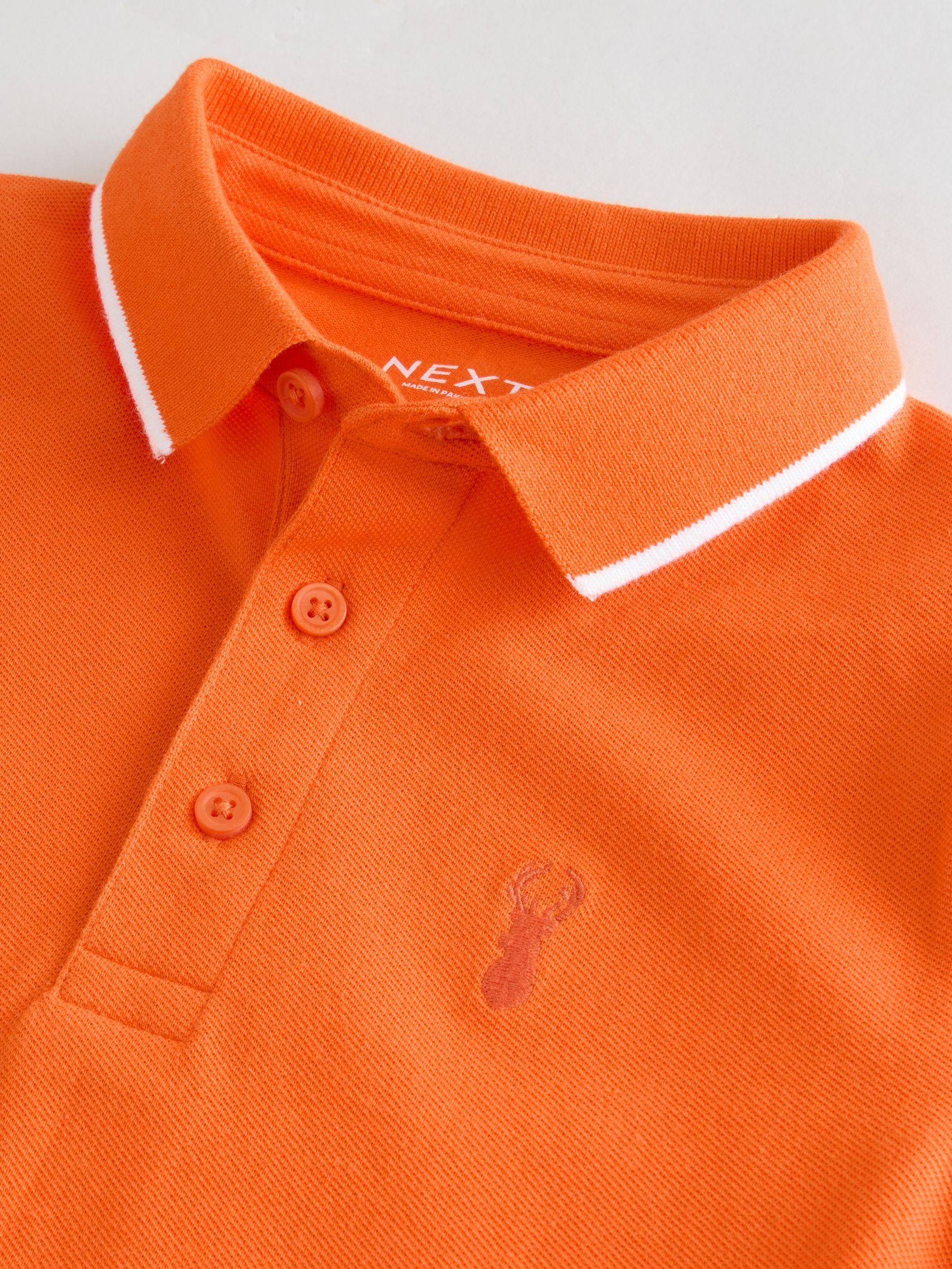 Buy Orange - Short Sleeve Polo Shirt (3-16yrs) from Next Germany