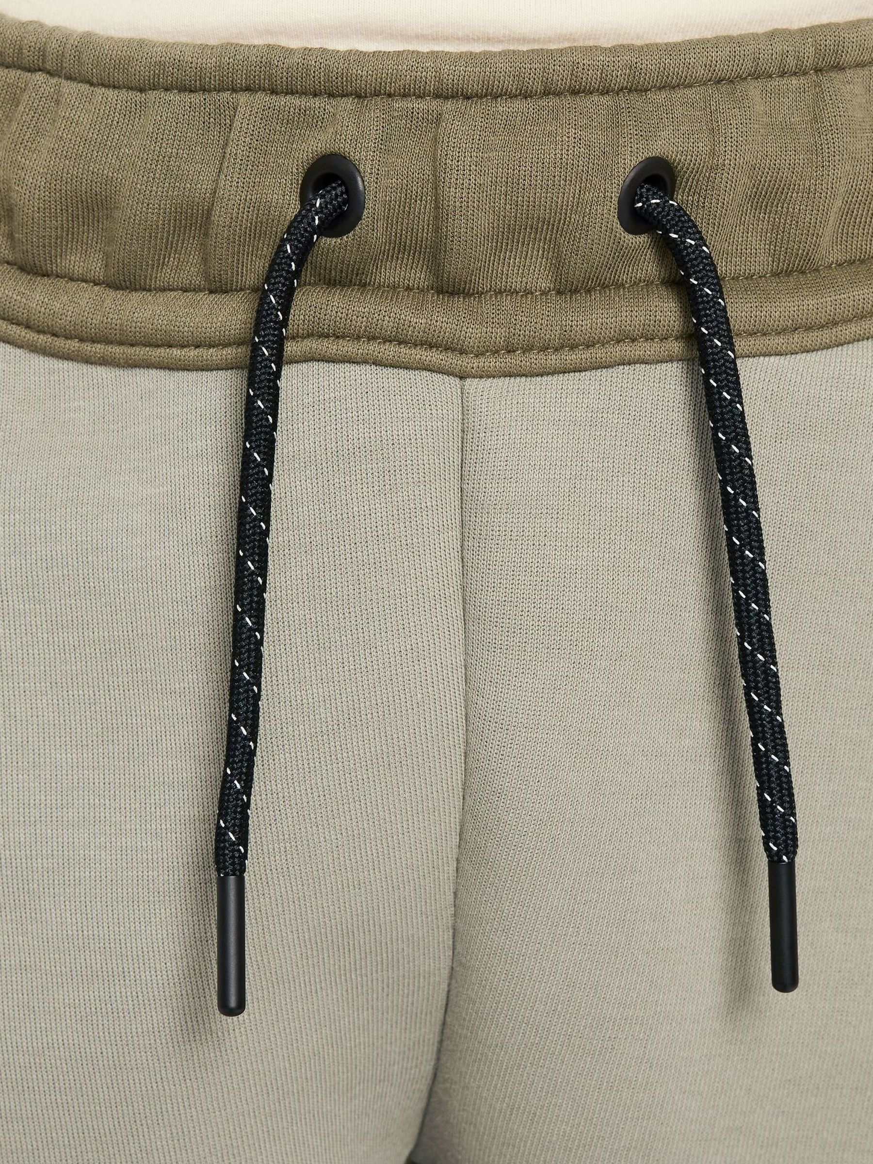 Buy Nike Medium Olive Green Tech Fleece Joggers from the Next UK online ...