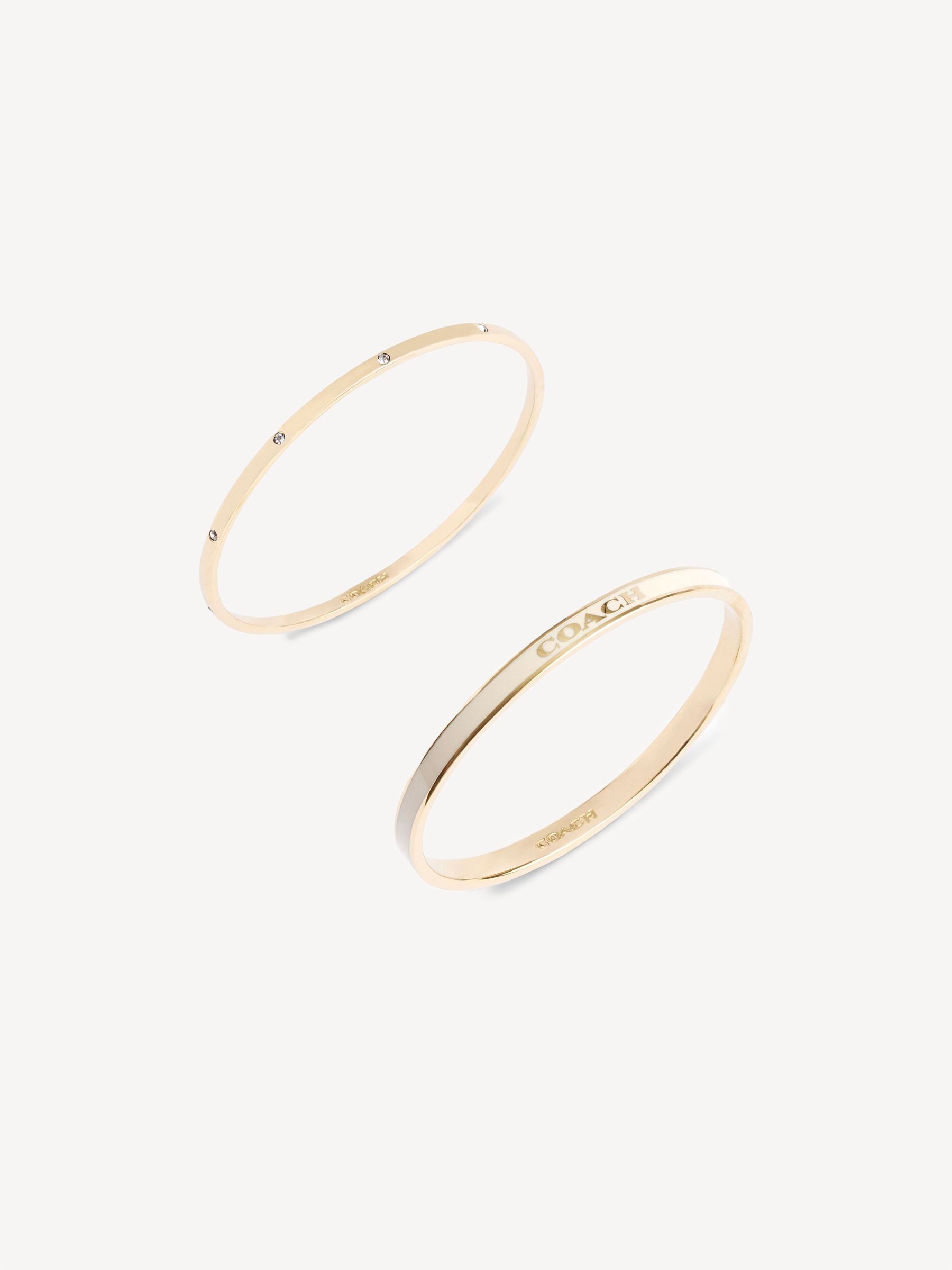Buy COACH Gold/White COACH Gold Tone Signature Duo Boxed Bangle Set ...