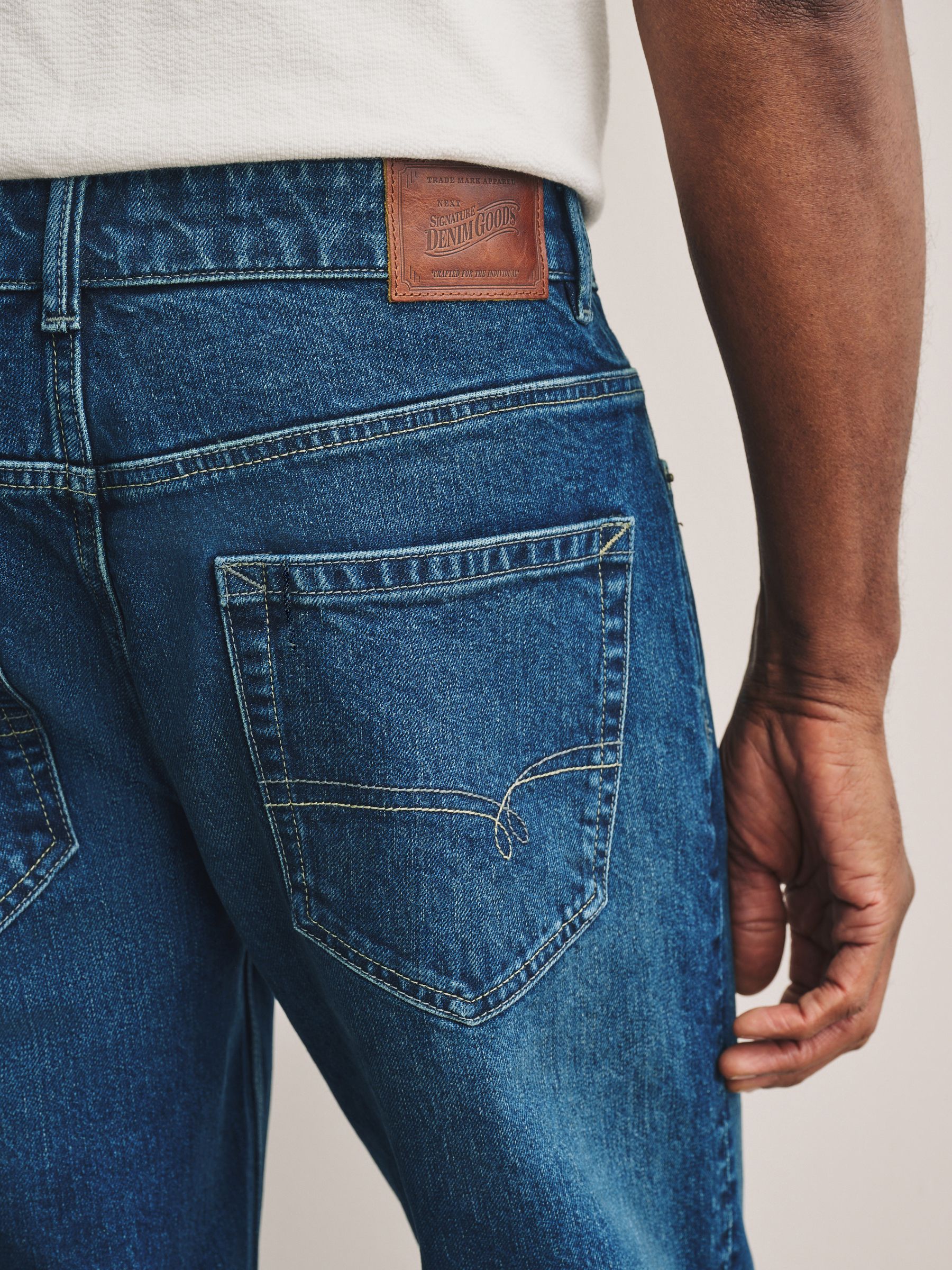 Buy Dark Blue Straight Fit Signature Soft Touch Denim Jeans from the ...