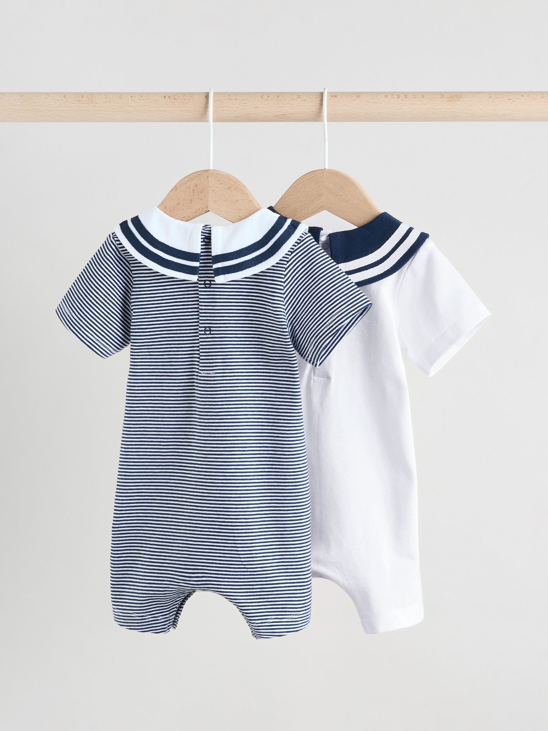 Buy Navy/White Textured Baby Rompers 2 Pack from the Next UK online shop