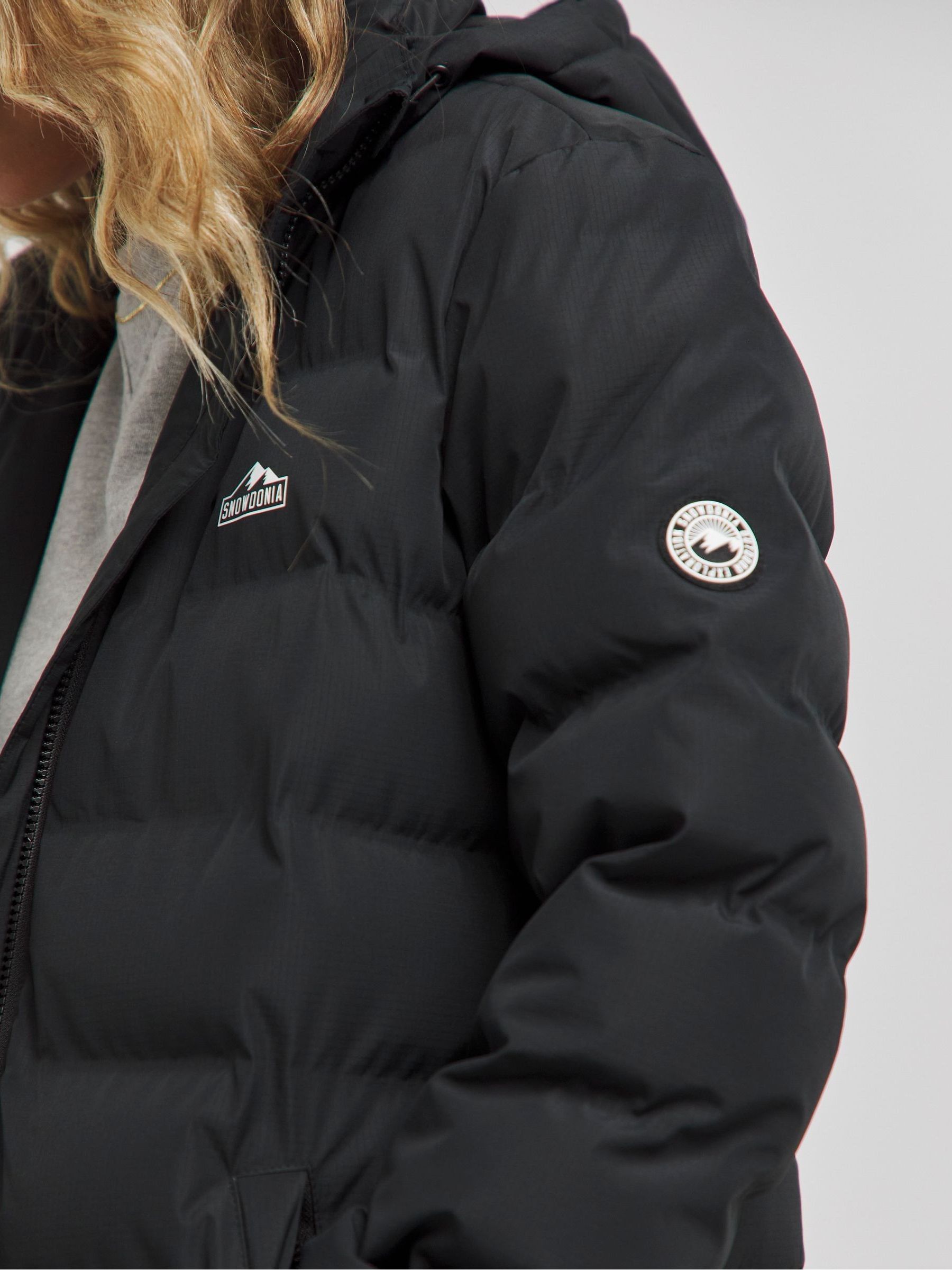 Buy Snowdonia Black Showerproof Long Padded Jacket from the Next UK ...