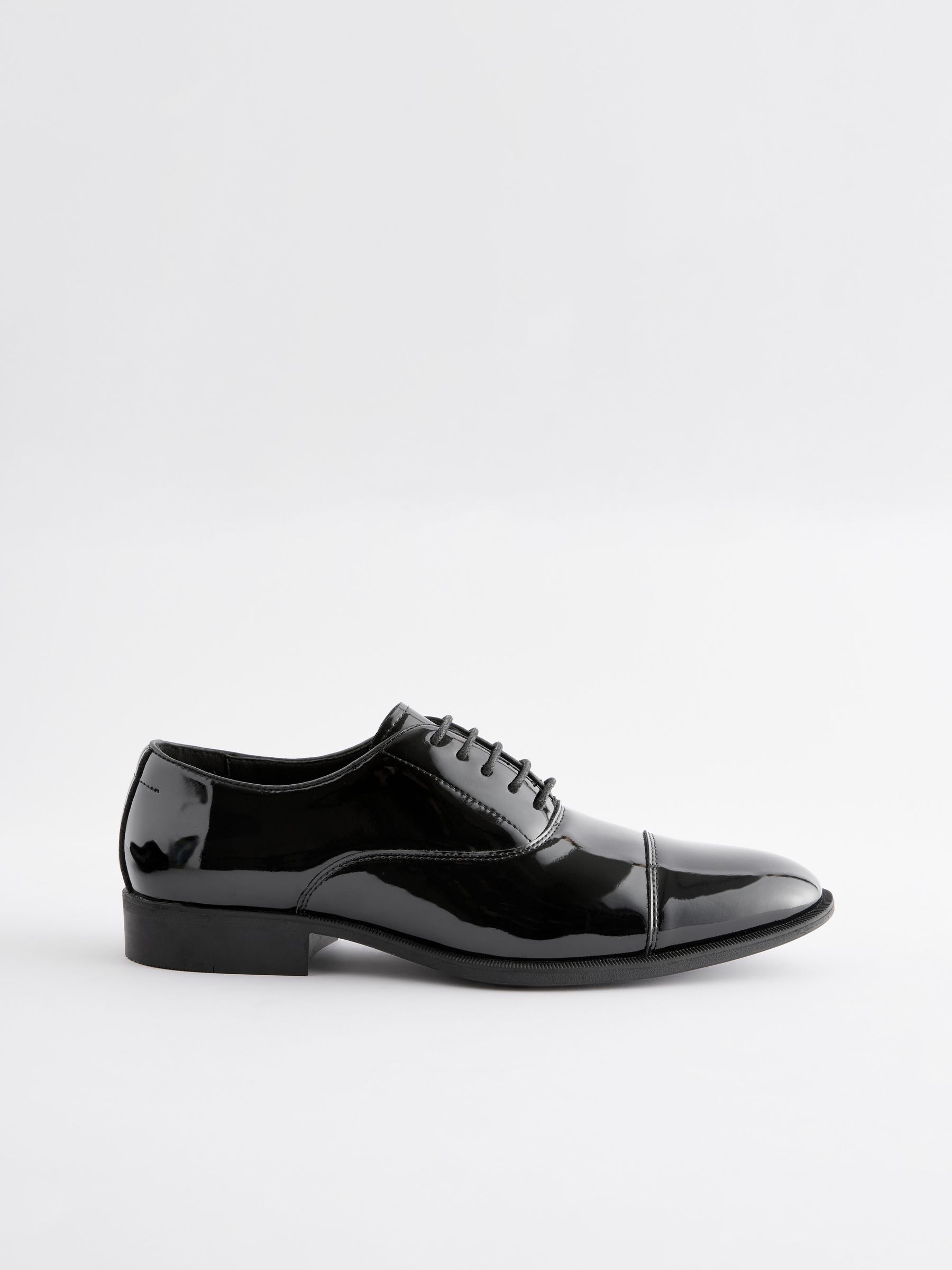 Buy Black Wide Fit Patent Oxford Toe Cap Shoes from the Next UK online shop
