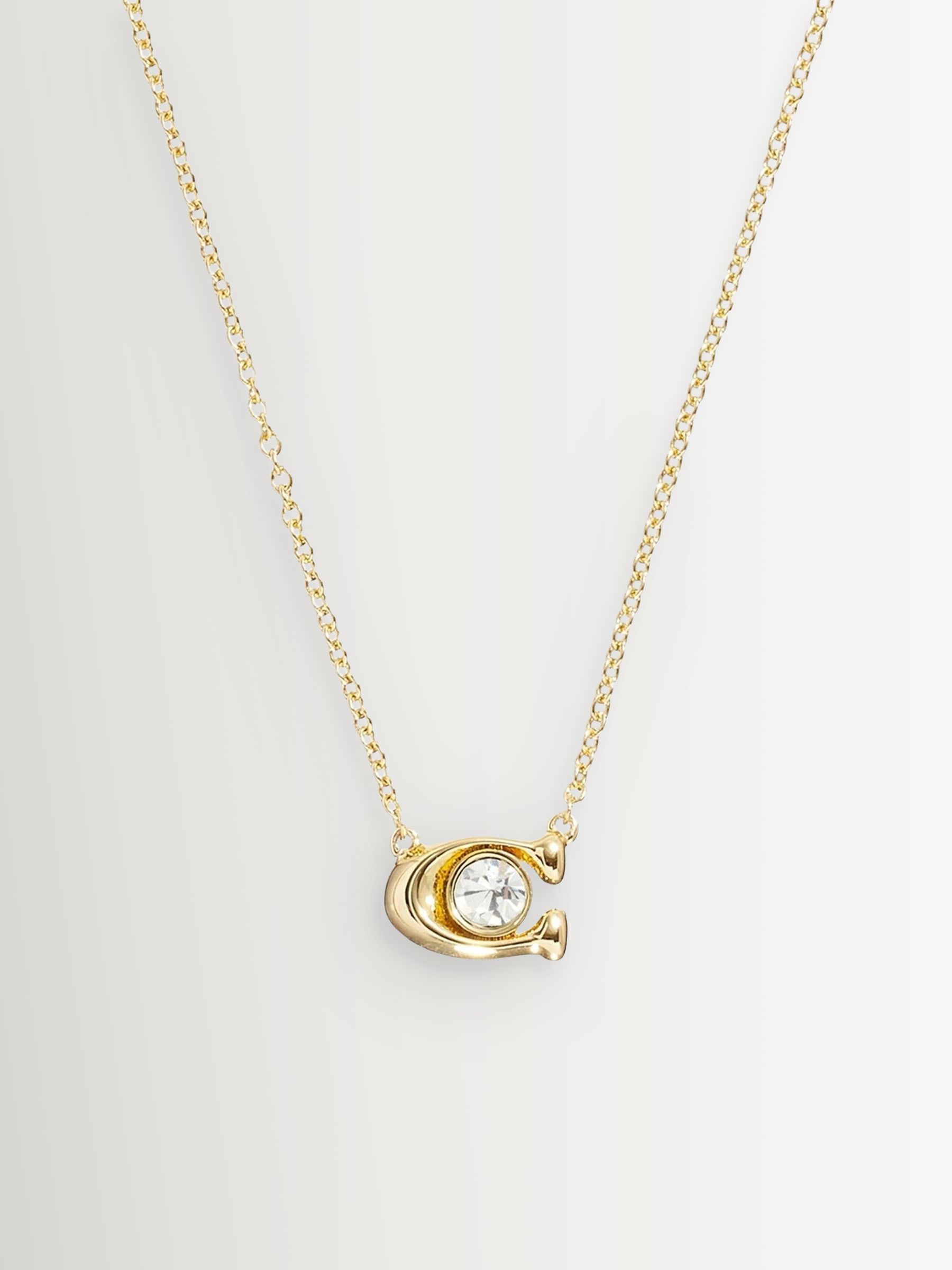 Buy COACH Gold Tone Signature Necklace and Earrings Set from the Next ...