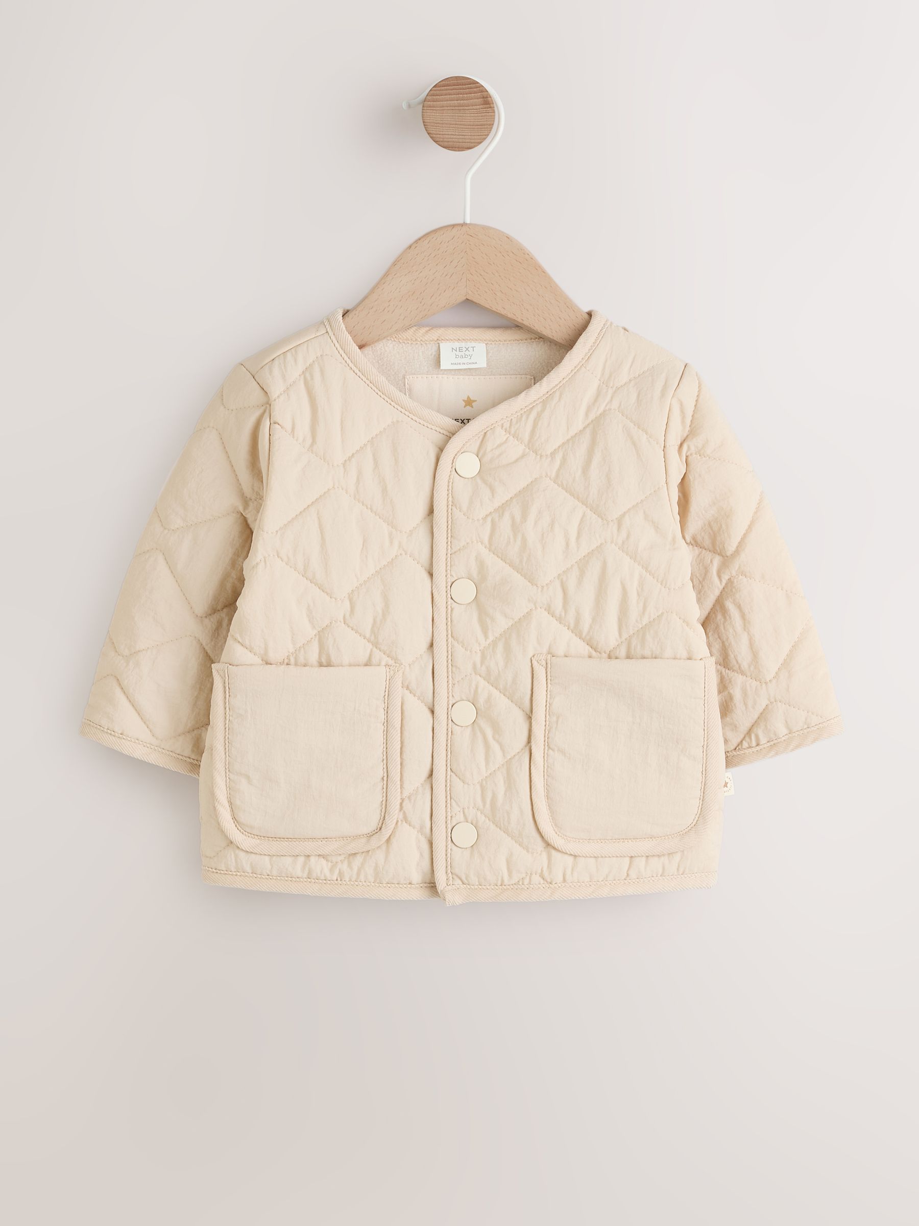 Buy Neutral Quilted Popper Baby Jacket from Next USA