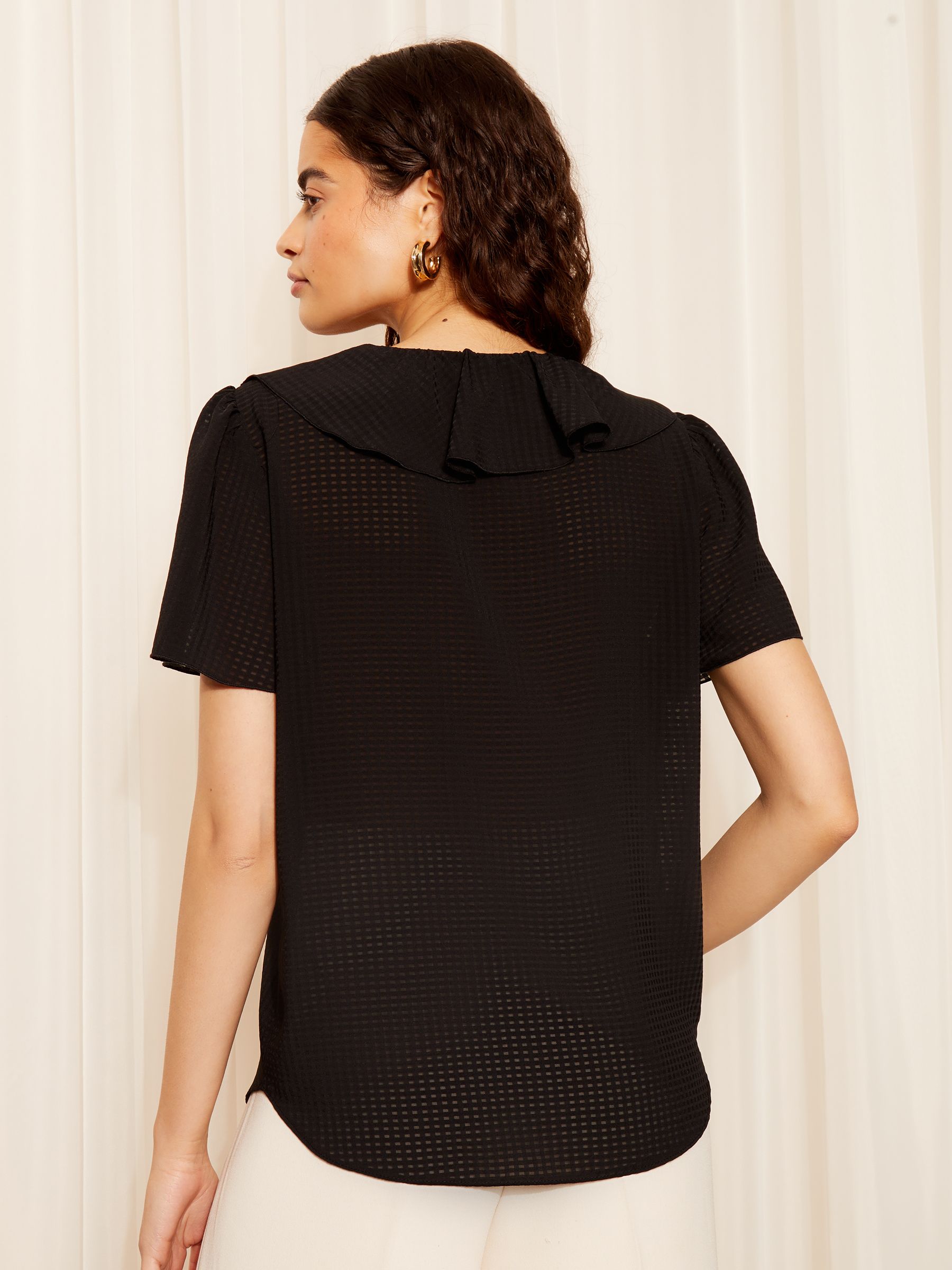 Buy Friends Like These Black Ruffle Front Puff Sleeve Blouse from the ...