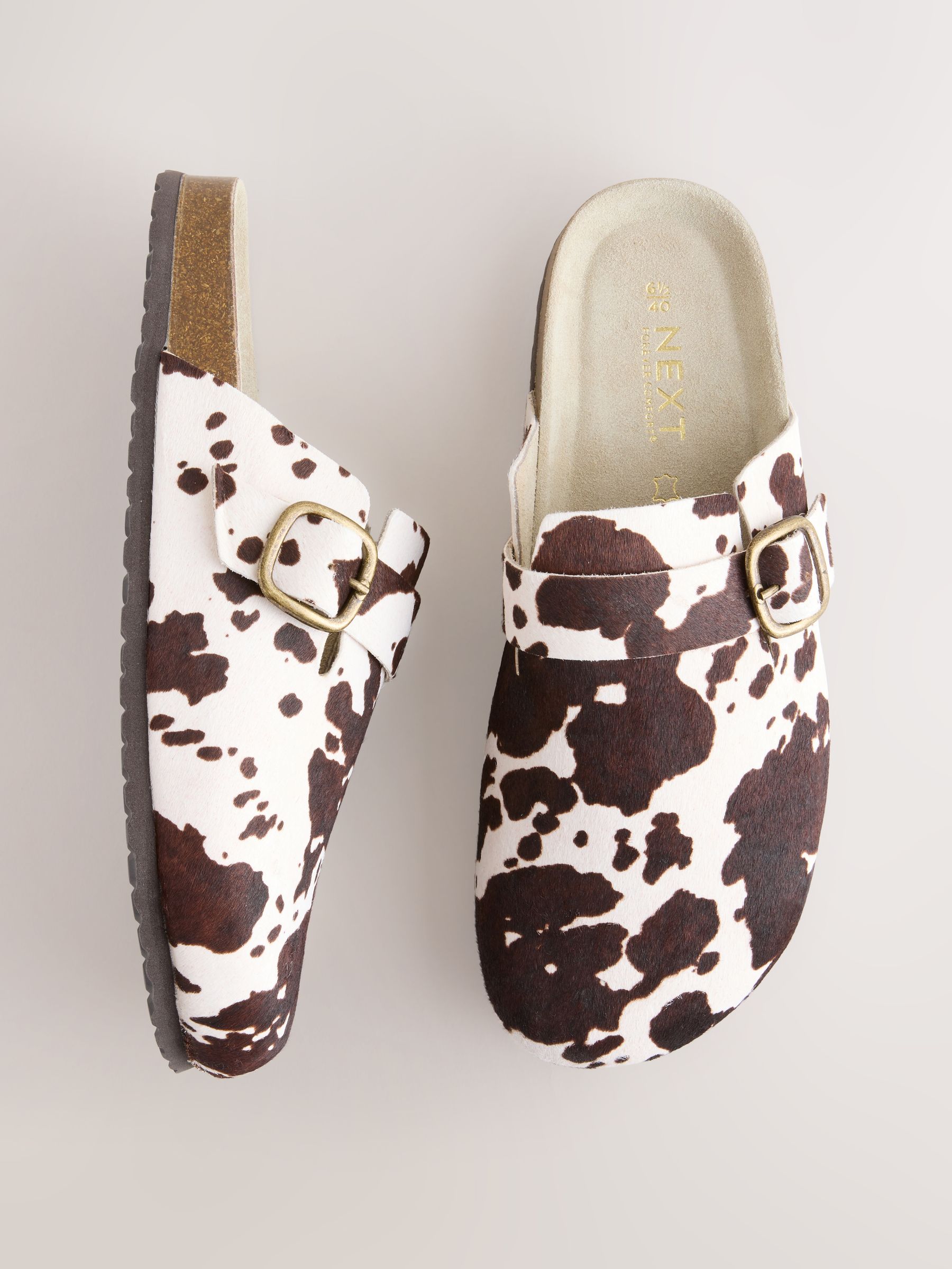Buy Cow Standard Fit Leather Footbed Clogs from the Next UK online shop