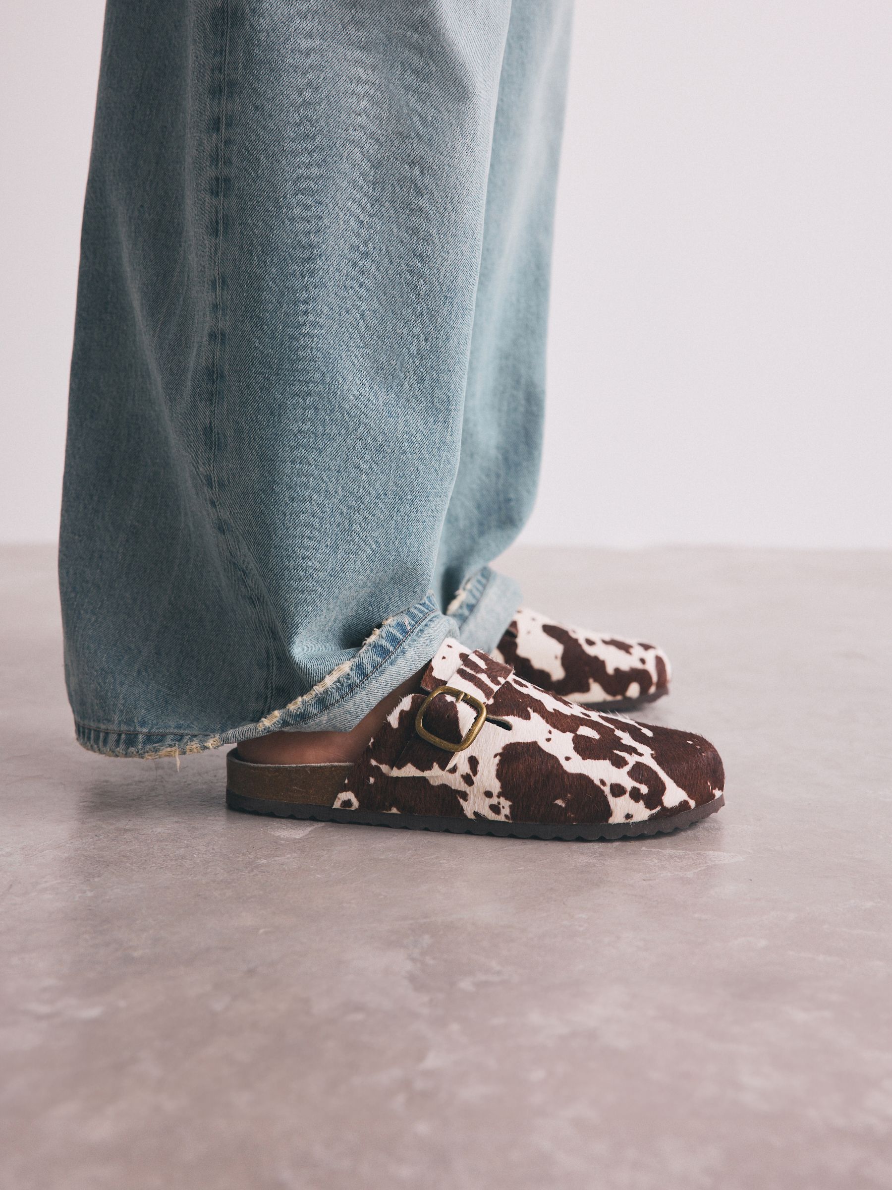 Buy Cow Standard Fit Leather Footbed Clogs from the Next UK online shop
