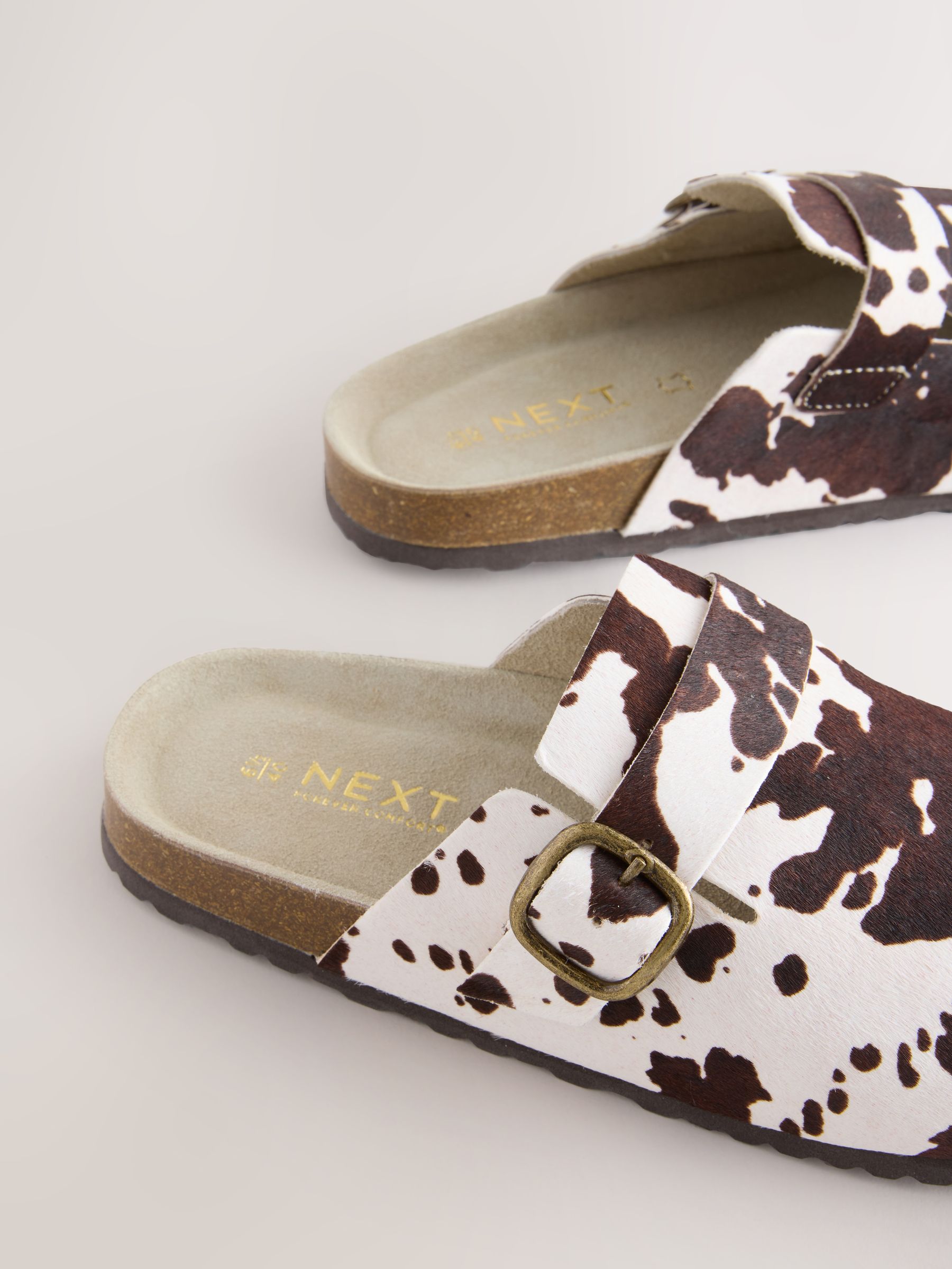 Buy Cow Standard Fit Leather Footbed Clogs from the Next UK online shop