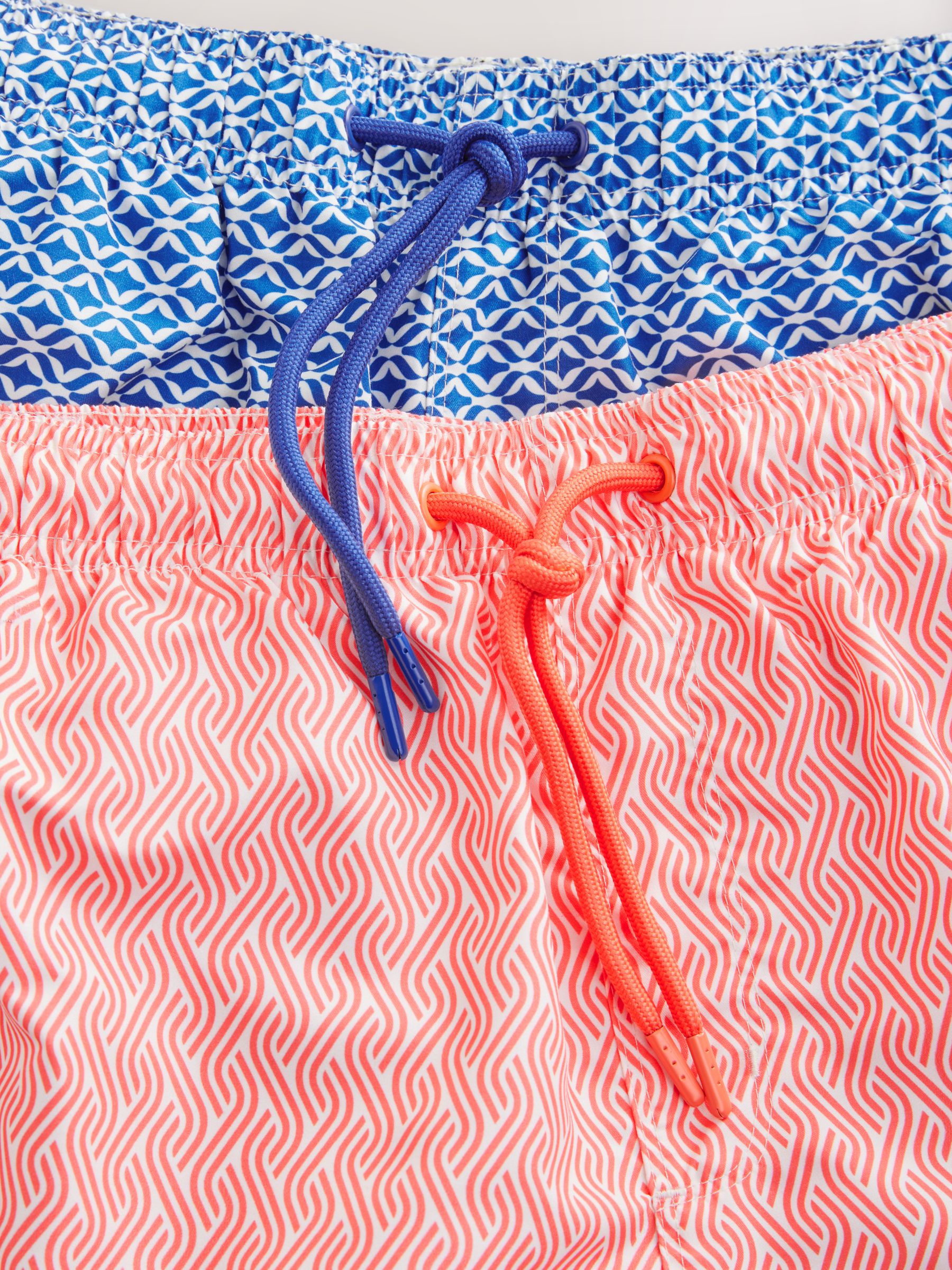 Buy Bright Blue/Coral Geometric Printed Swim Shorts 2 Pack from the ...