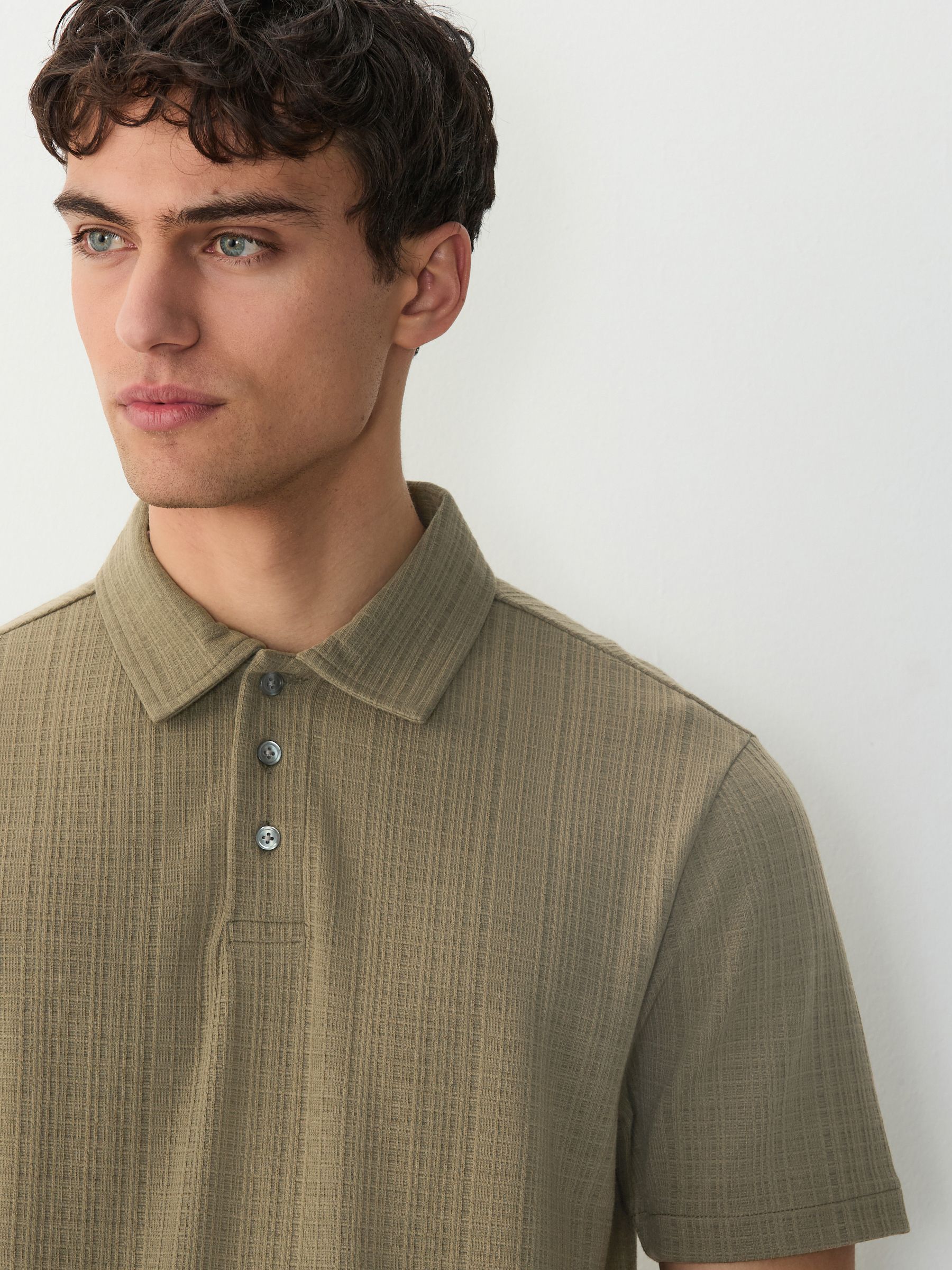 Buy Khaki Green Crepe Textured Button Neck Polo Shirt from Next Indonesia