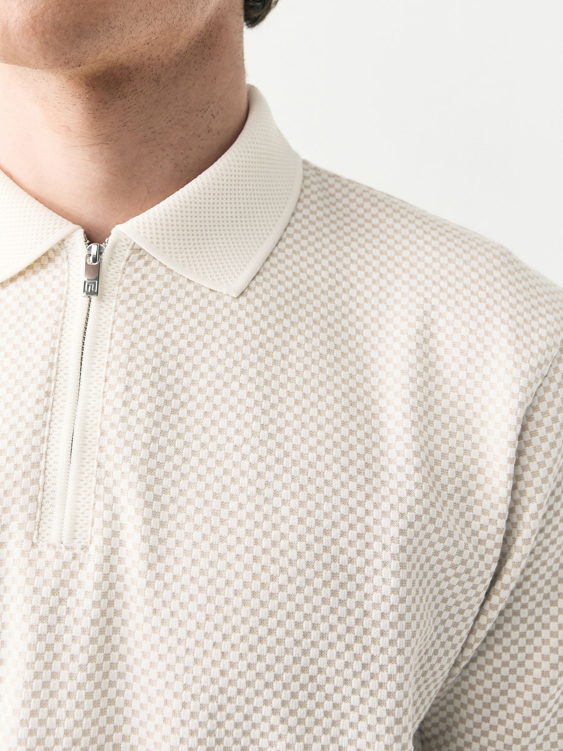 Buy White Regular Fit Smart Quarter Zip Polo Shirt from the Next UK ...