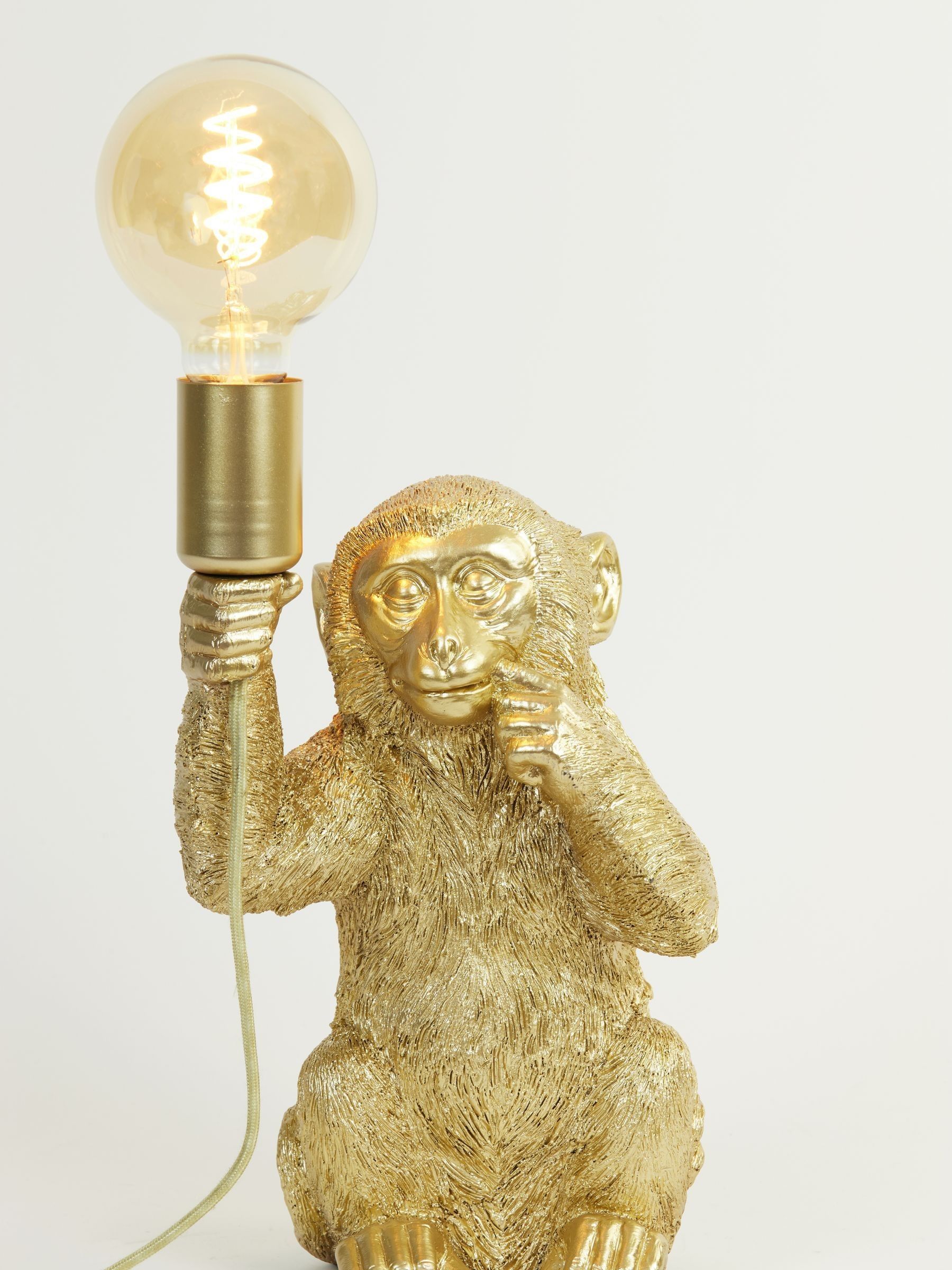 Buy Light & Living Gold Monkey Table Lamp from the Next UK online shop