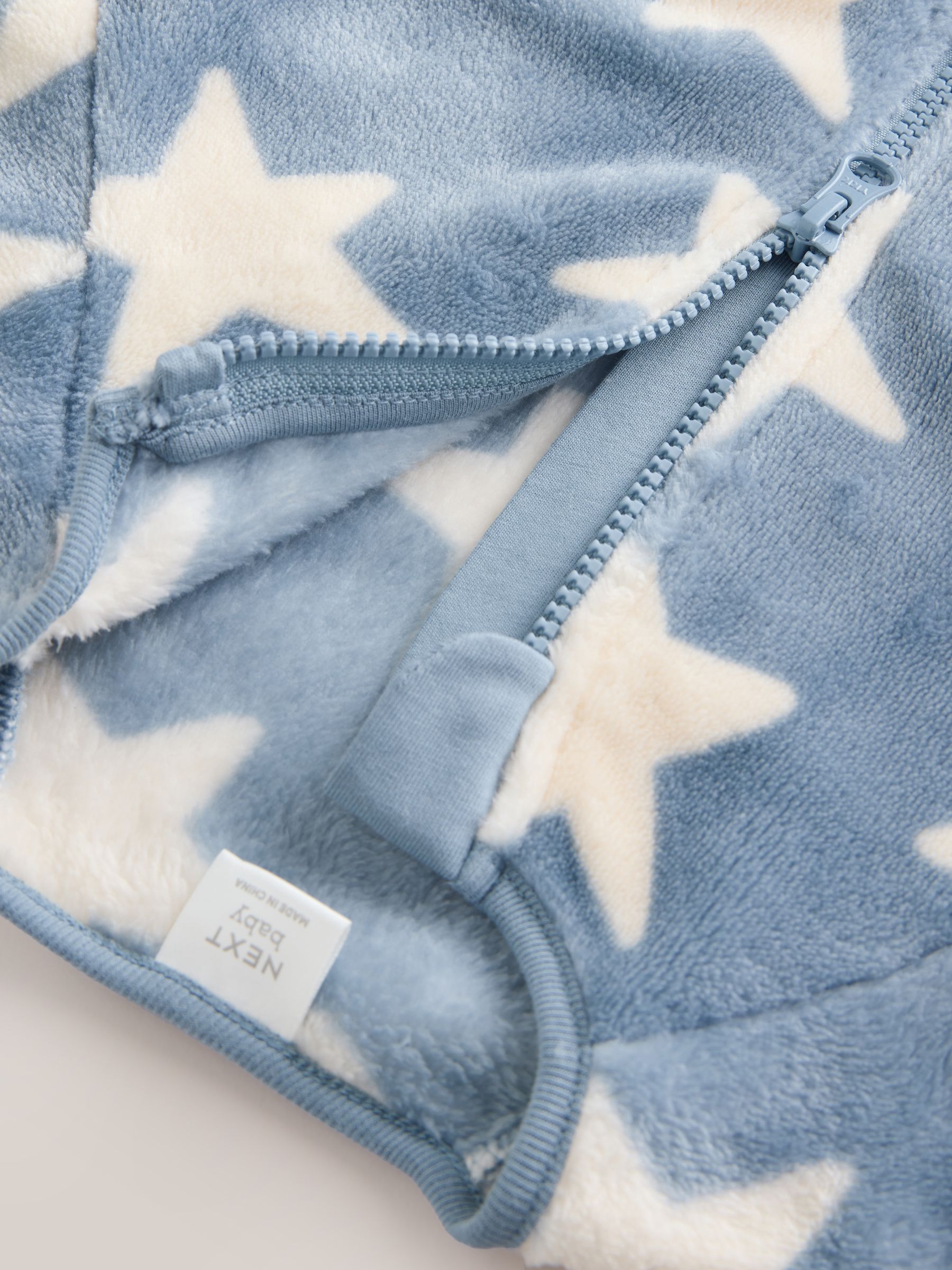 Buy Blue Star Fleece Baby Sleepsuit from the Next UK online shop