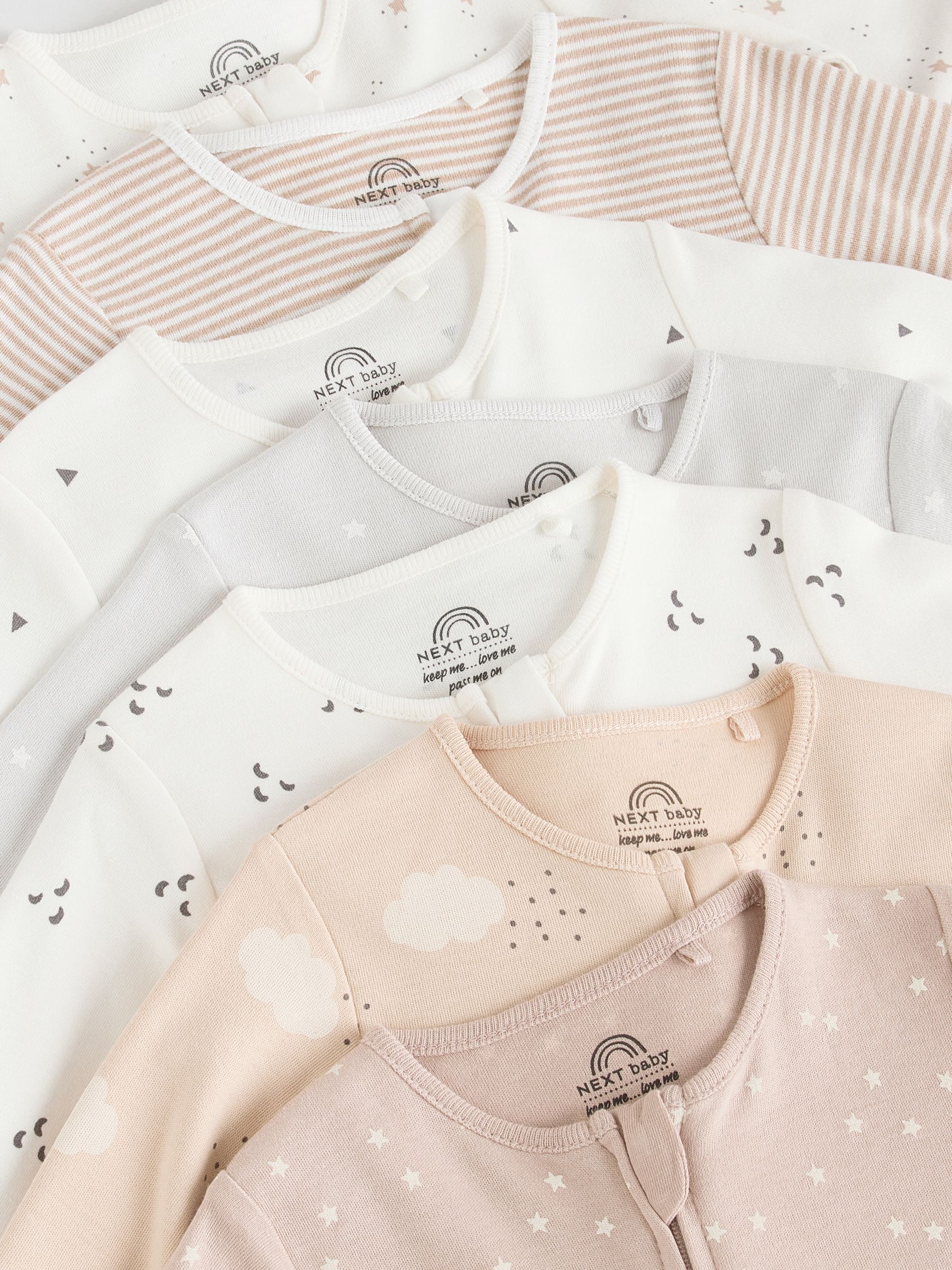 Buy Neutral 7 Pack Two Way Zip Baby Sleepsuits (0-2yrs) from the Next ...