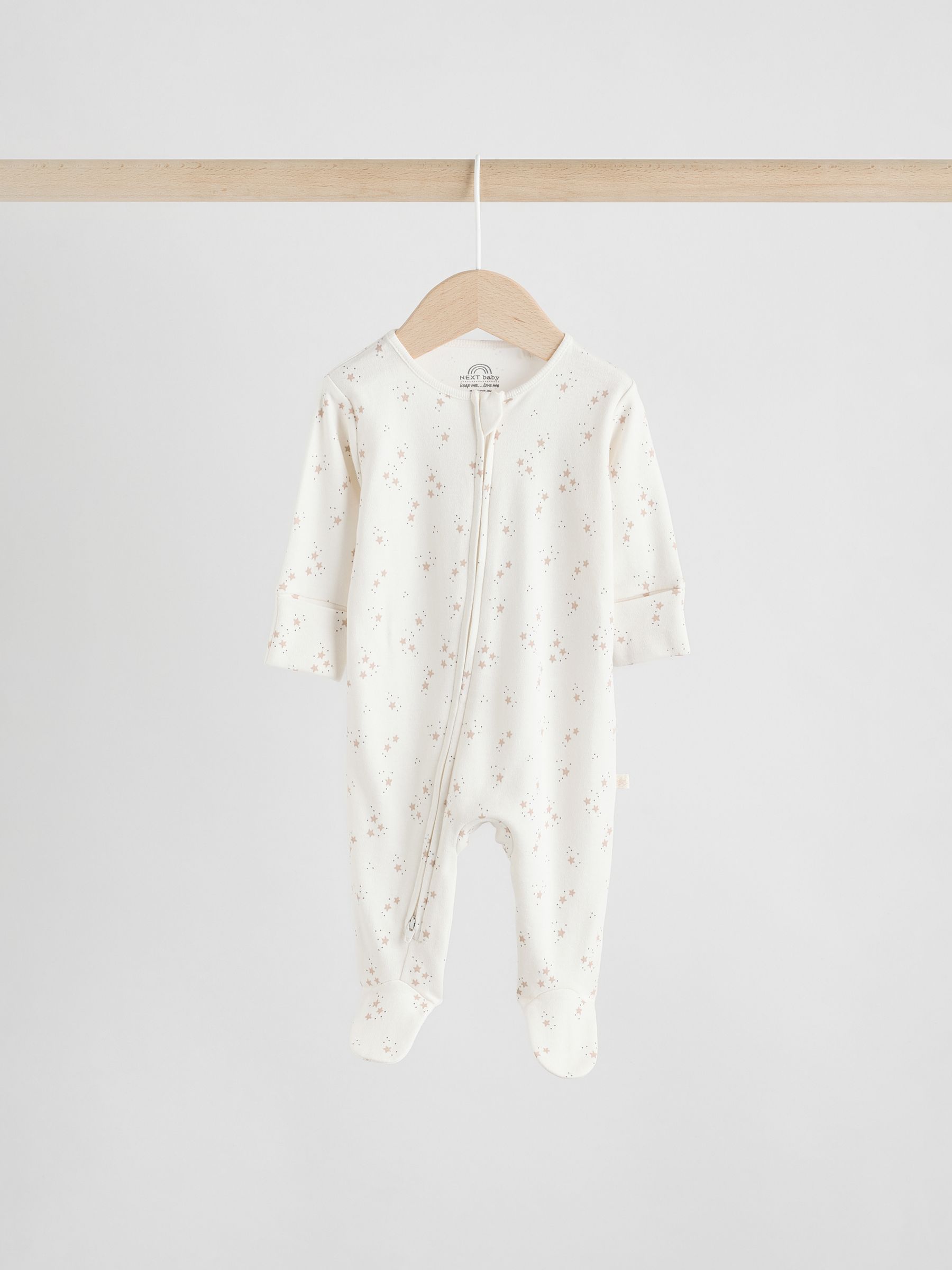 Buy Neutral 7 Pack Two Way Zip Baby Sleepsuits (0-2yrs) from the Next ...