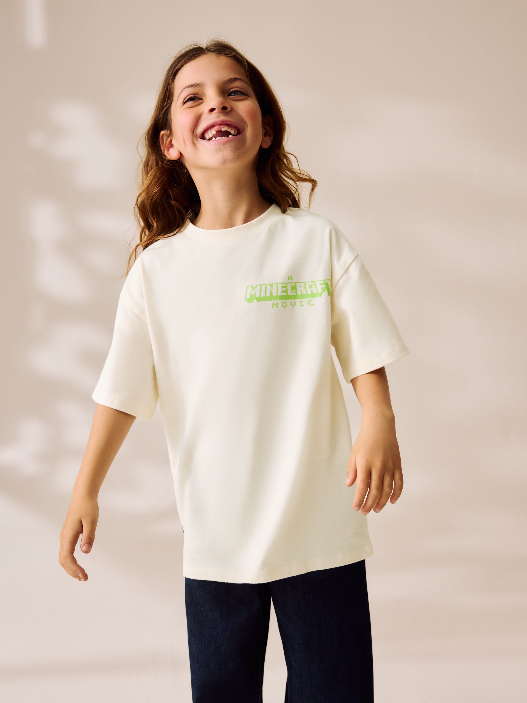 Buy Cream Oversized Graphic Print T-Shirt (3-16yrs) from the Next UK ...