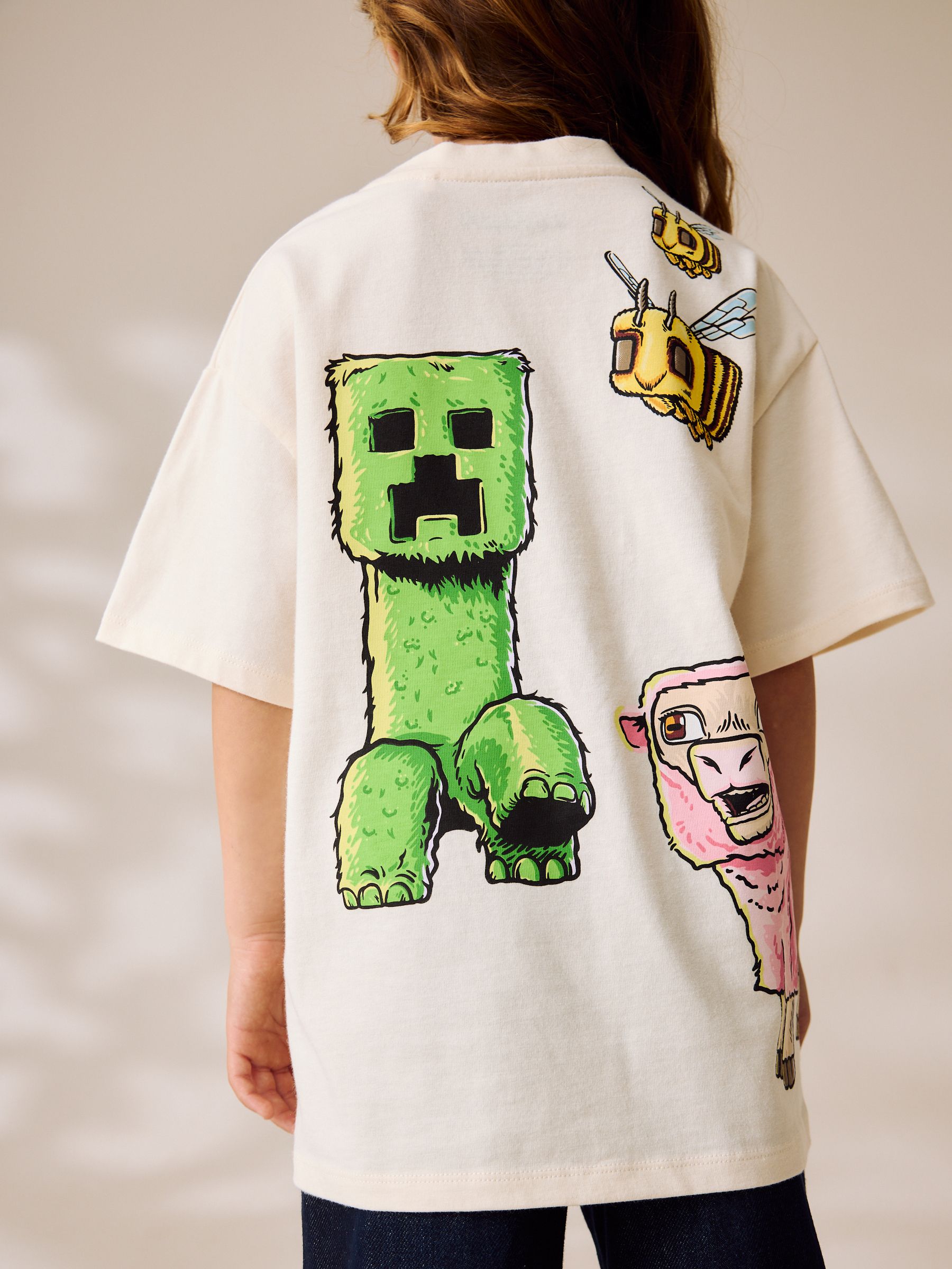 Buy Cream Oversized Graphic Print T-Shirt (3-16yrs) from the Next UK ...