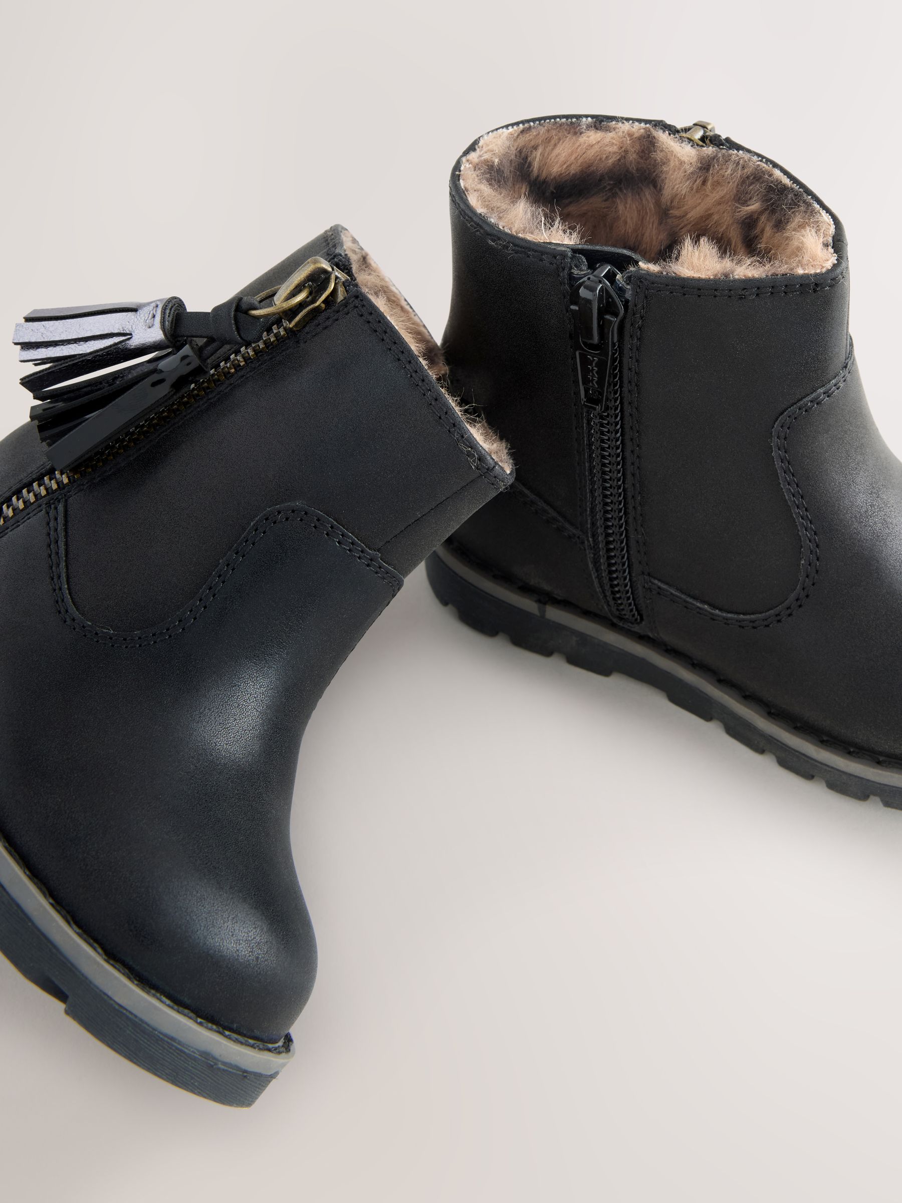 Buy Black Standard Fit (F) Chelsea Zip Tassel Ankle Boots from the Next ...