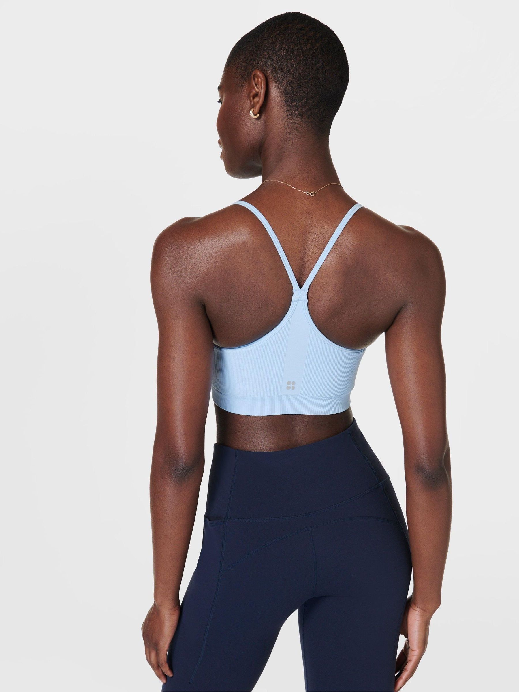 Buy Sweaty Betty Light Blue Spirit Restored Seamless Yoga Bra from the ...