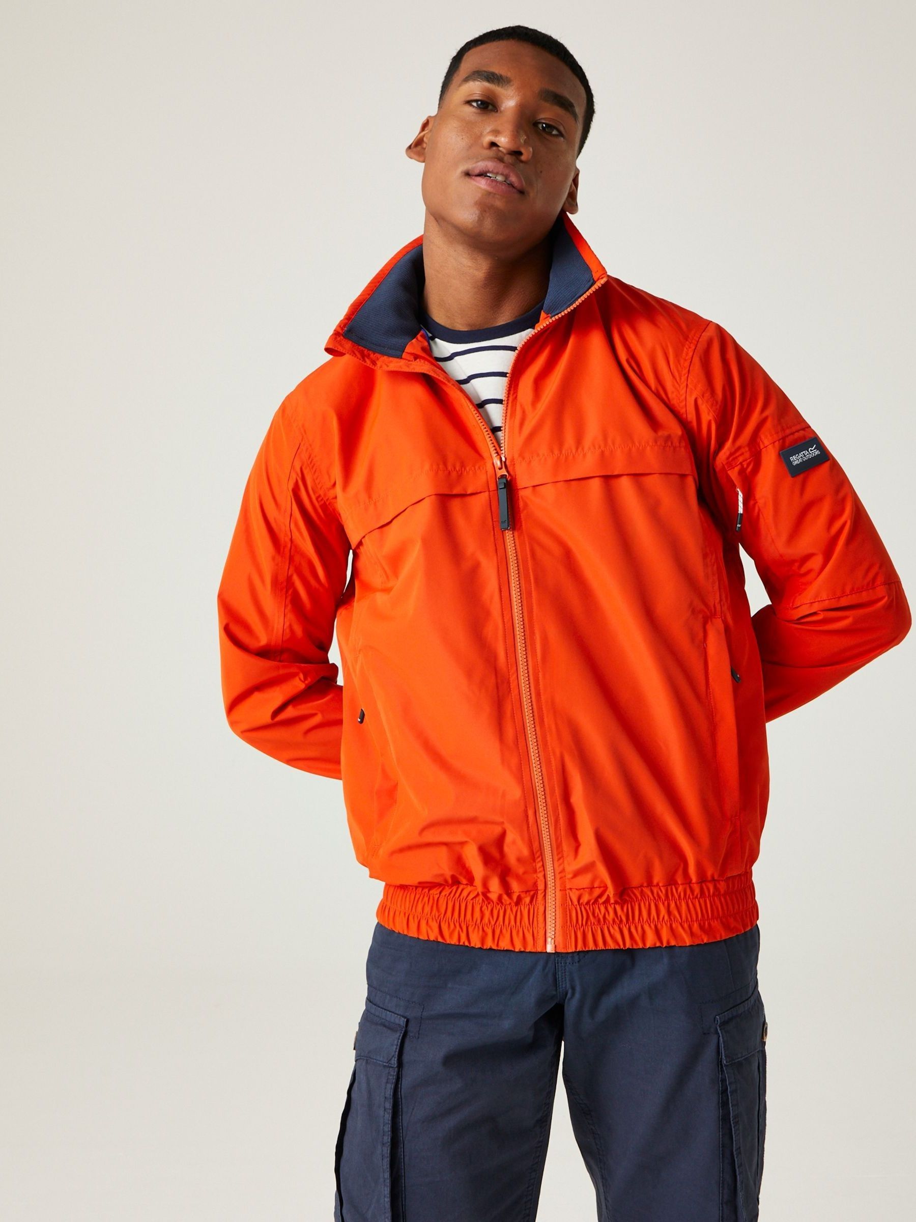 Buy Regatta Orange Shorebay II Waterproof Jacket from the Next UK ...