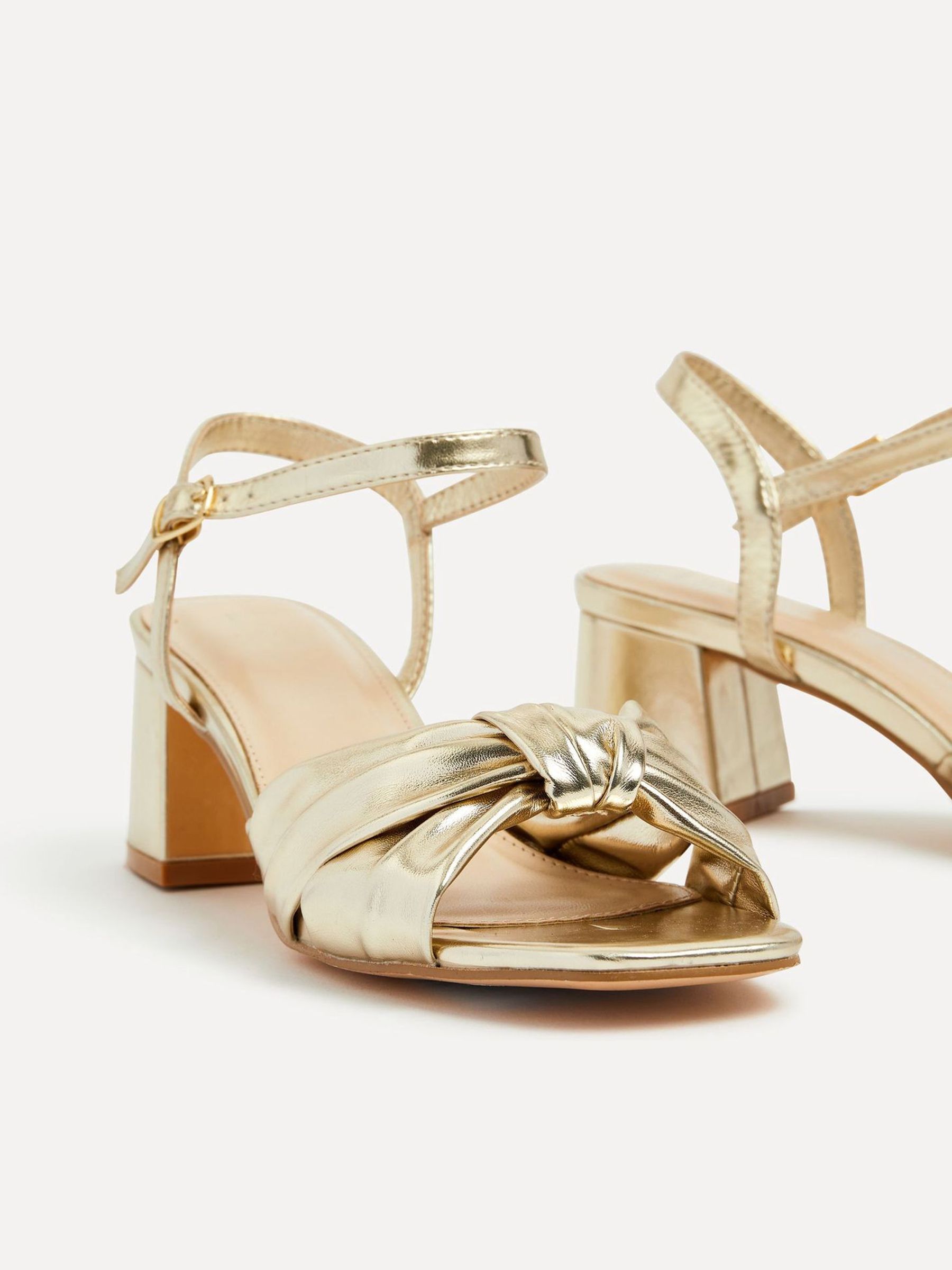Buy Linzi Gold Charlotte Block Heeled Sandals With Bow Front Detail ...