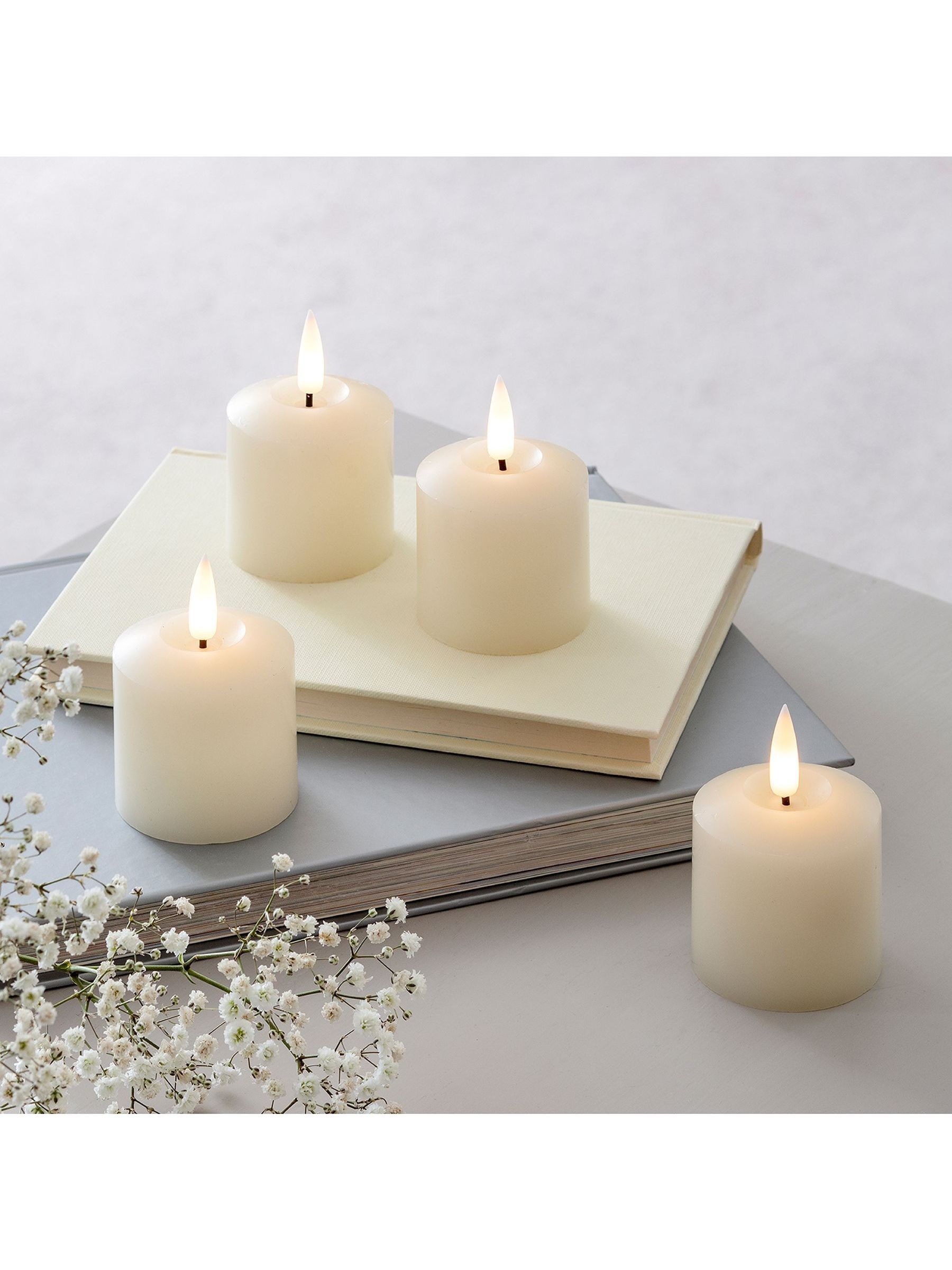 Buy Lights4fun Set of 4 TruGlow LED Votive Candles from the Next UK ...