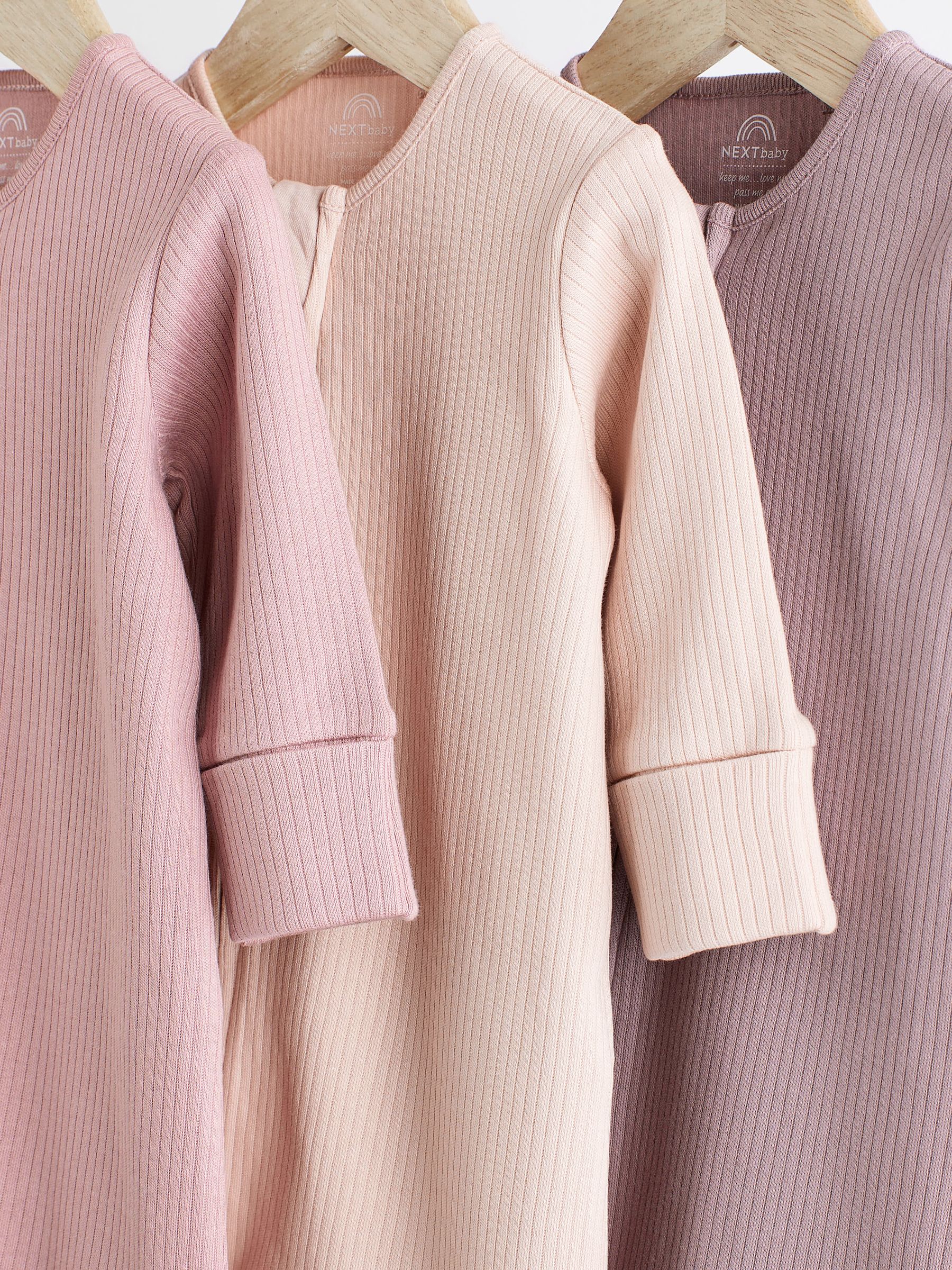 Buy Pink 3 Pack Two Way Zip Baby Sleepsuits (0mths-3yrs) from the Next ...