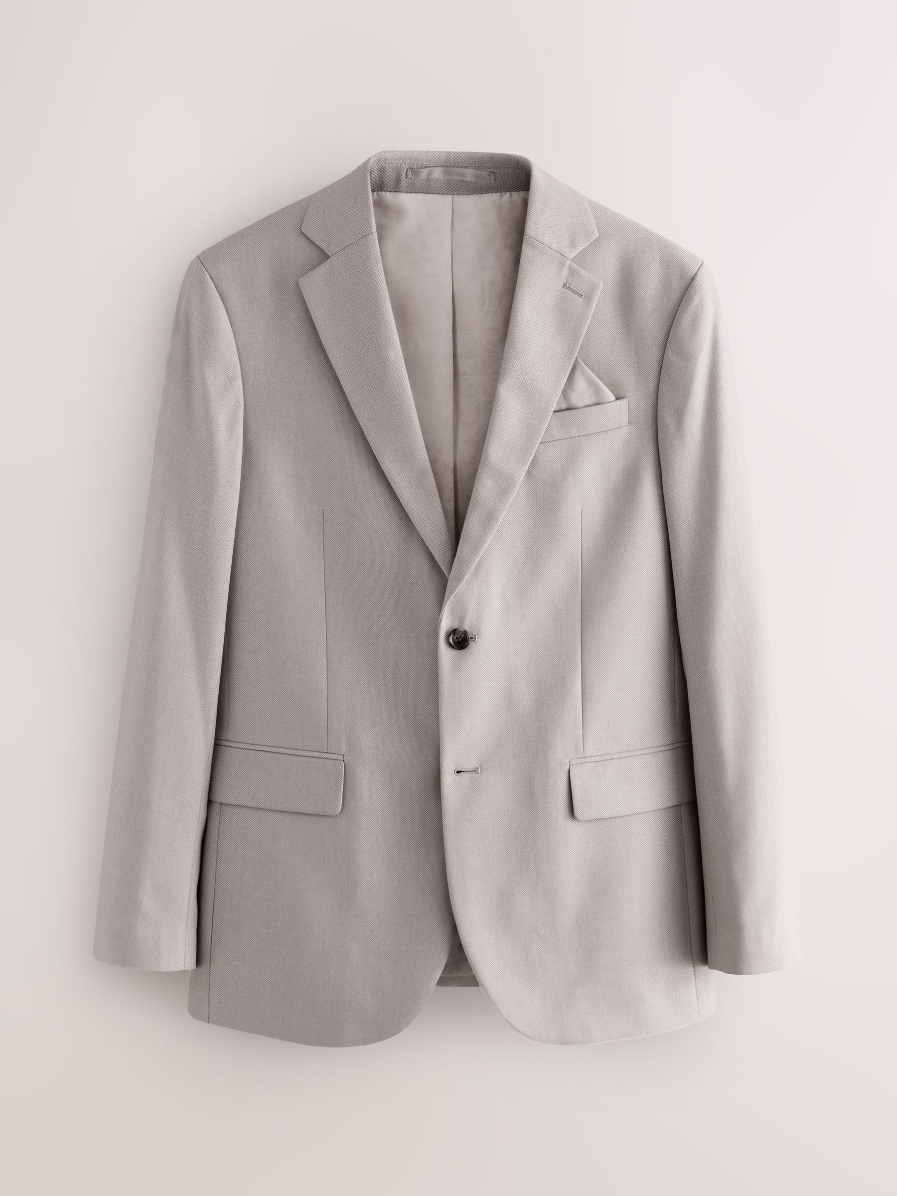 Buy Neutral Regular Fit Textured Suit Jacket from the Next UK online shop