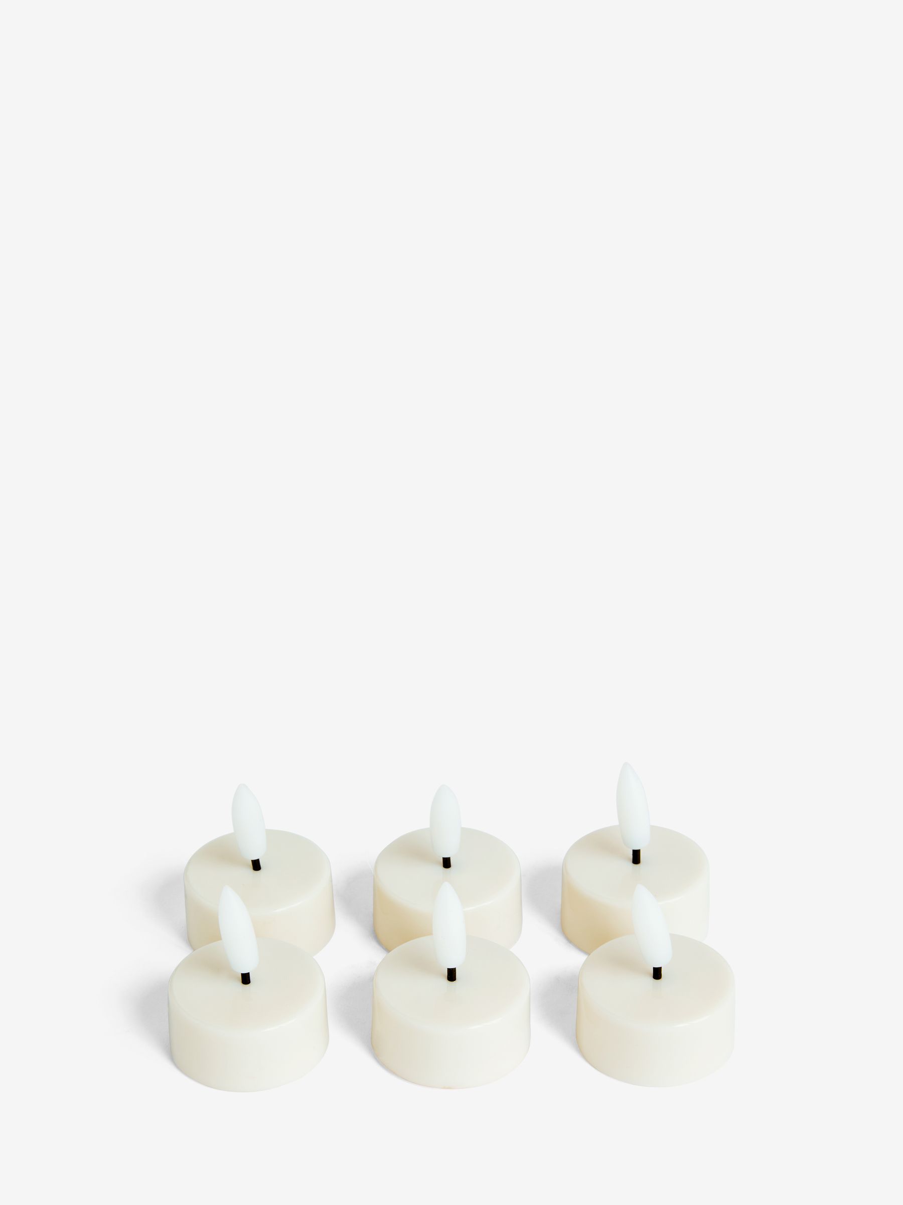 Buy Set of 6 White LED Tea Light Unscented Candles from the Next UK ...