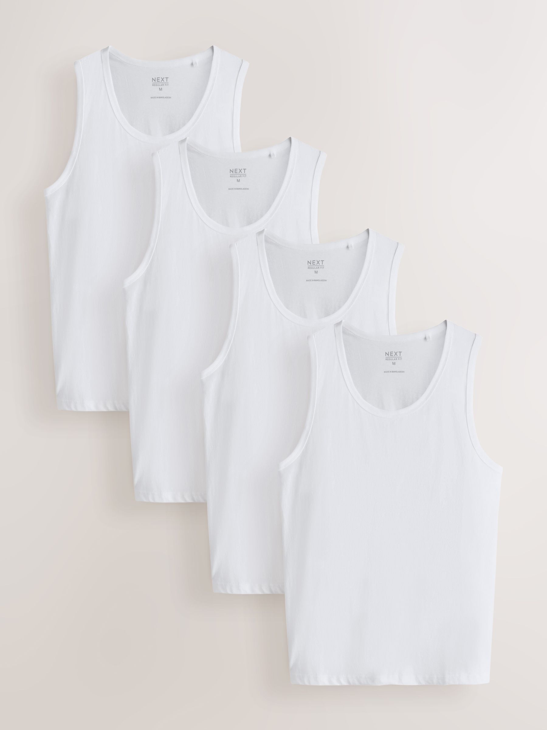 Buy White Cotton Vests 4 Pack from the Next UK online shop