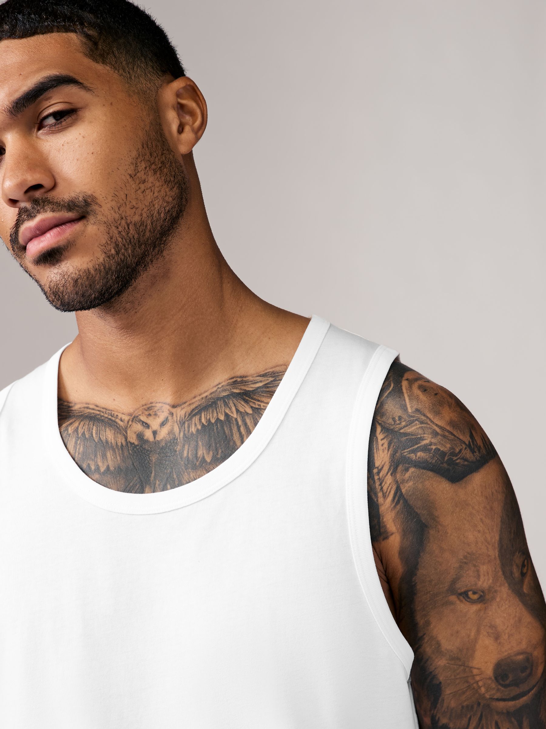 Buy White 100% Cotton Vests 4 Pack from Next Saudi Arabia