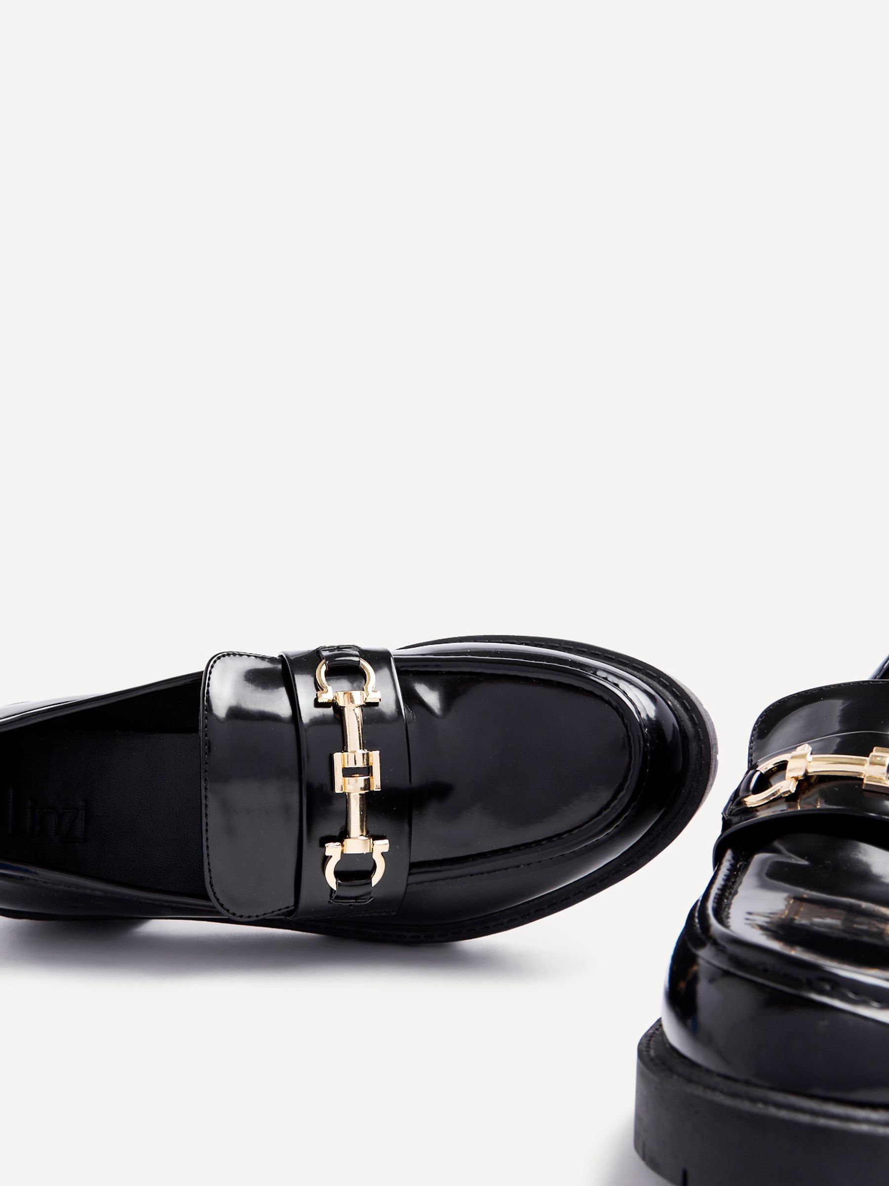 Buy Linzi Black Aria Chunky Sole Loafers With Gold Trim from the Next ...