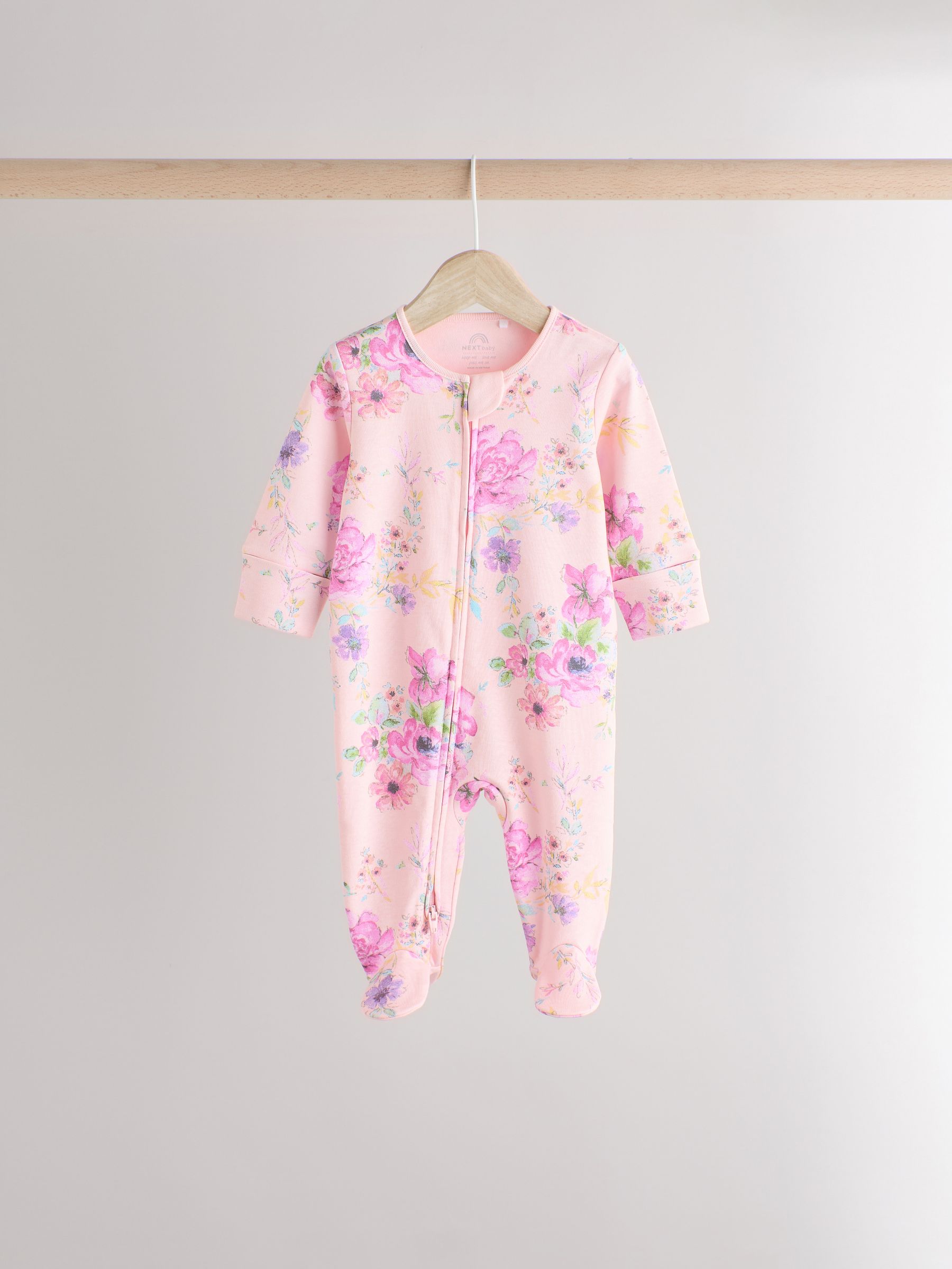 Buy Pink 3 Pack Two Way Zip Baby Sleepsuits (0mths-2yrs) from Next Ireland