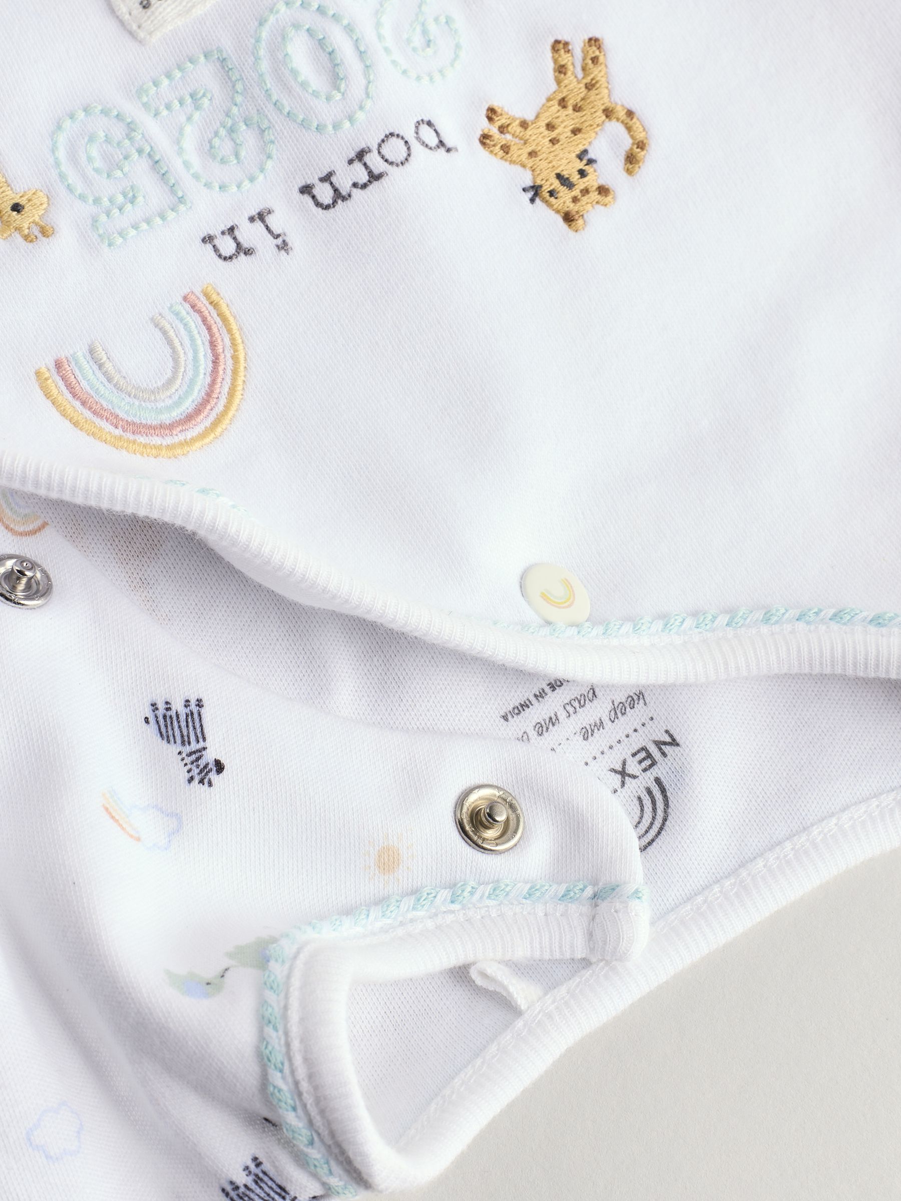 Buy White Born in 2025 Baby Sleepsuit & Hat Set (0-9mths) from the Next ...