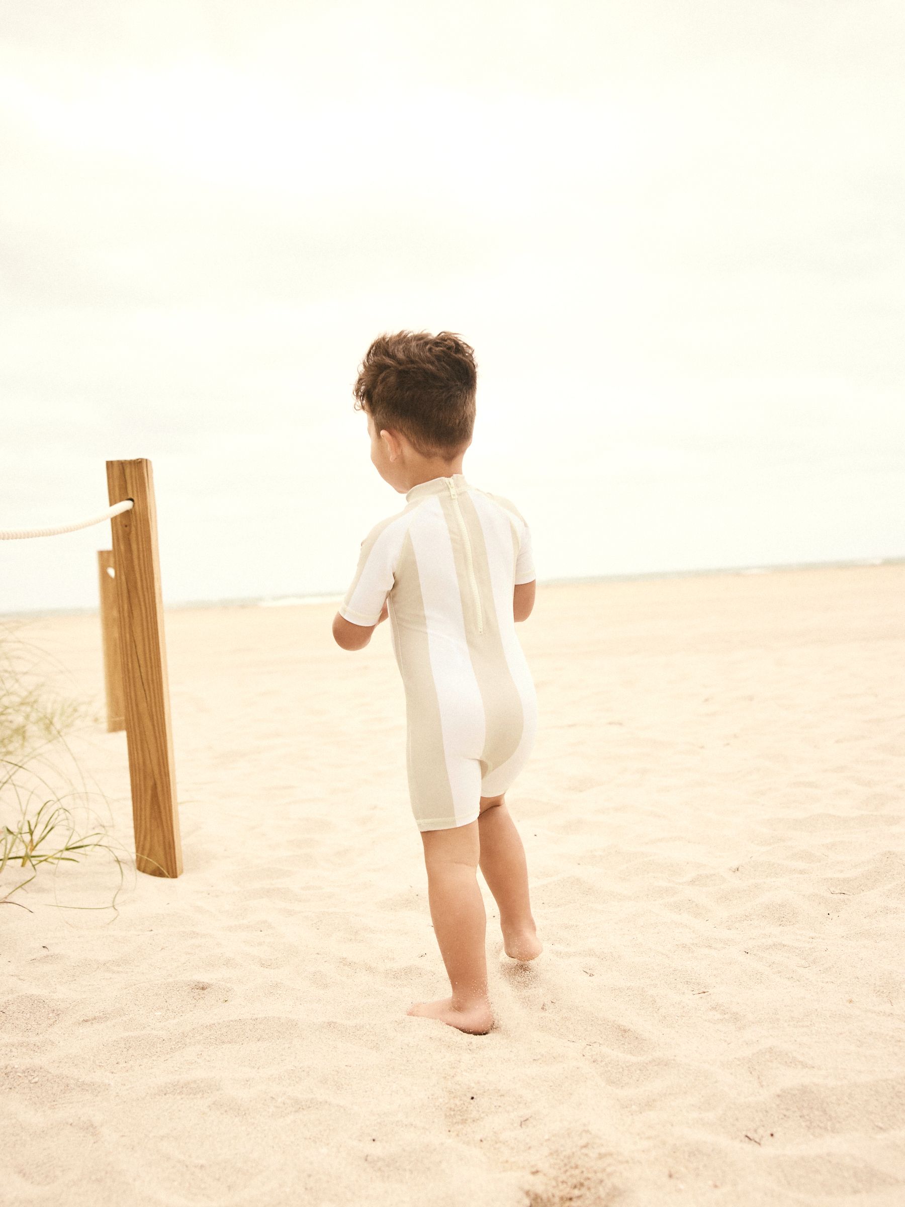 Buy Neutral White Stripe Sunsafe All-In-One Swimsuit (3mths-7yrs) from ...